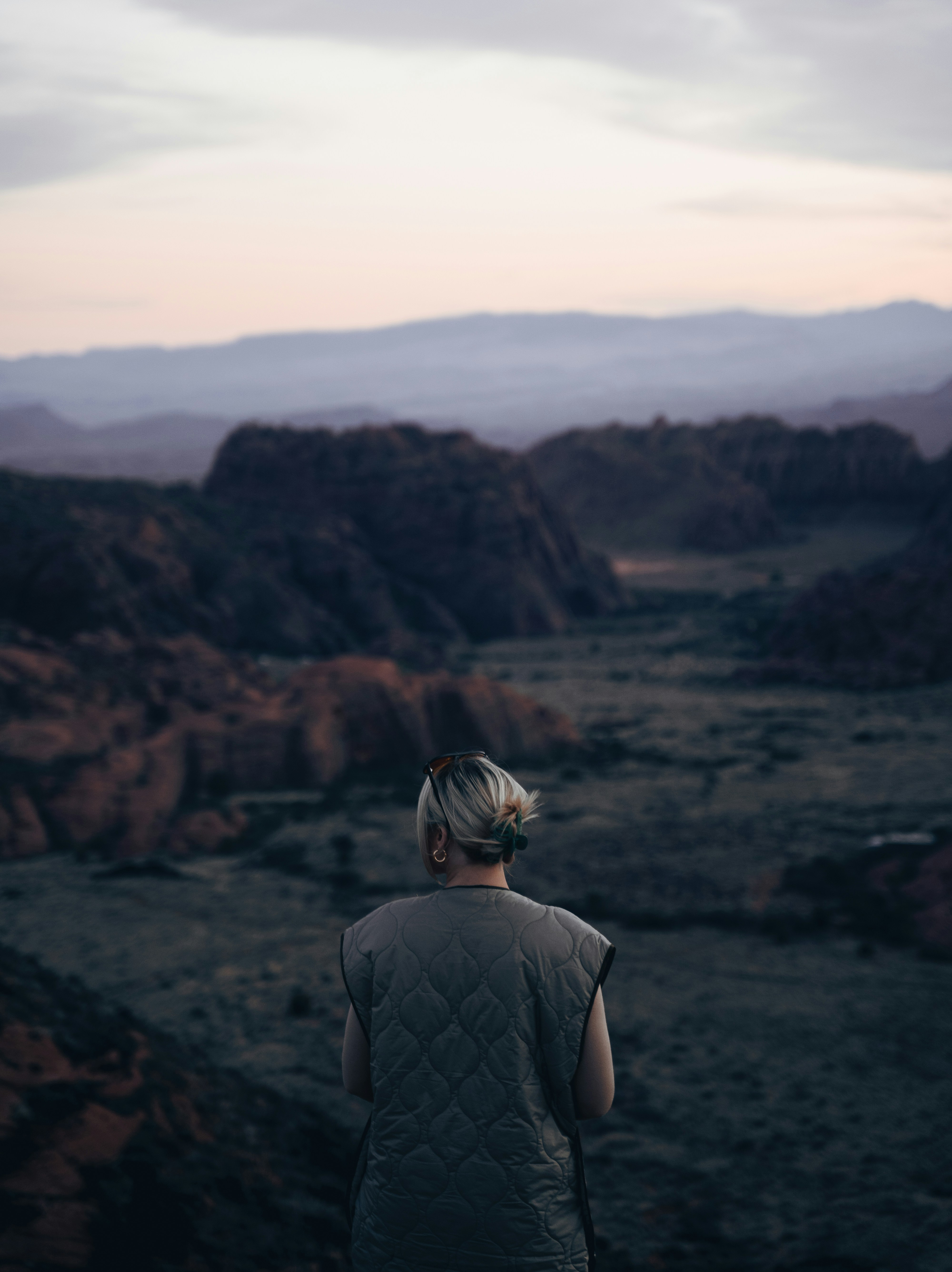Backlit Traveler in a Quiet Canyon at Dusk