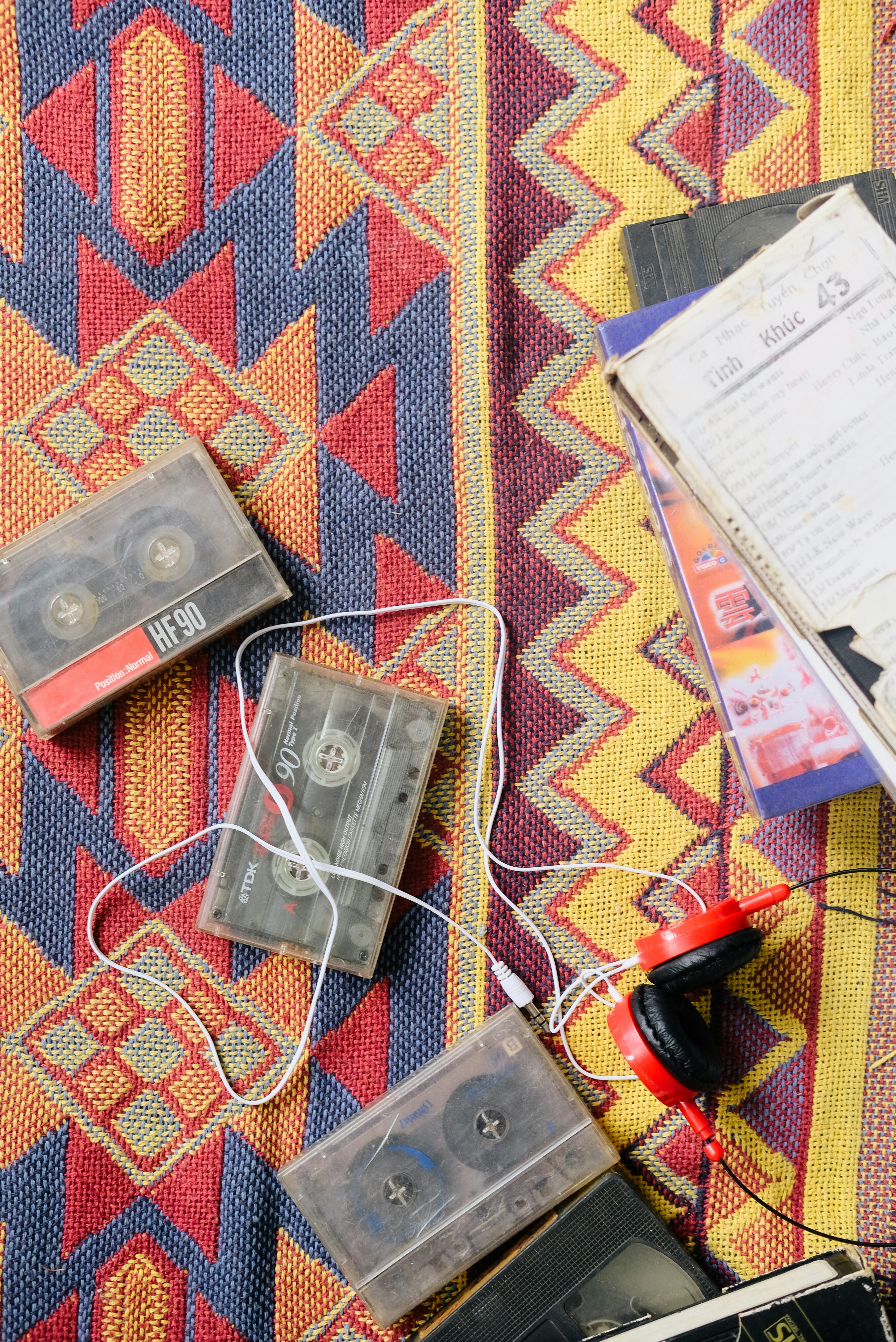 Retro Cassette Mosaic: Colorful Threads on a Geometric Rug