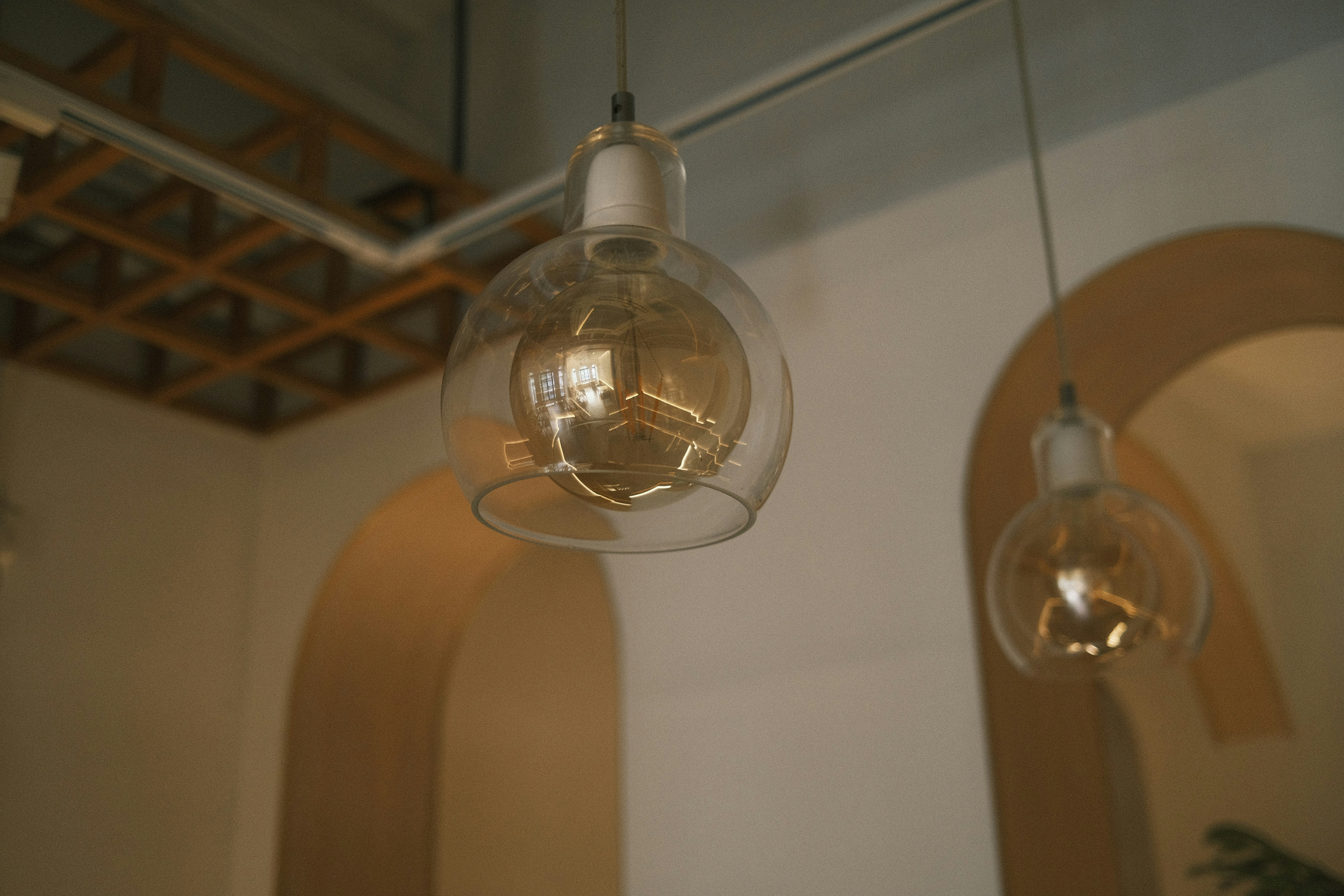 A couple of lights hanging from a ceiling photo – Free Light fixture ...
