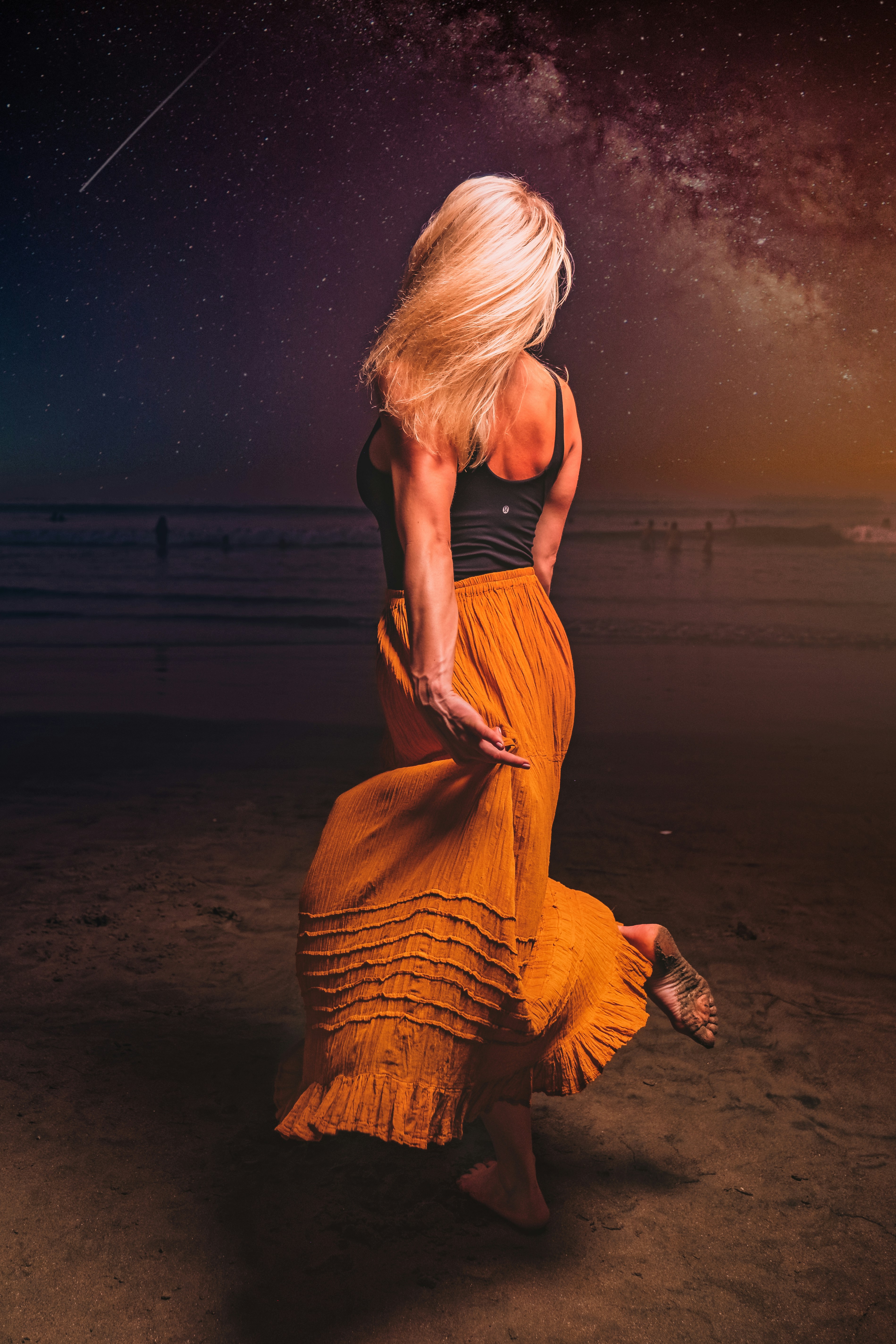 Moonlit Beach Dancer Under a Milky Way Gown