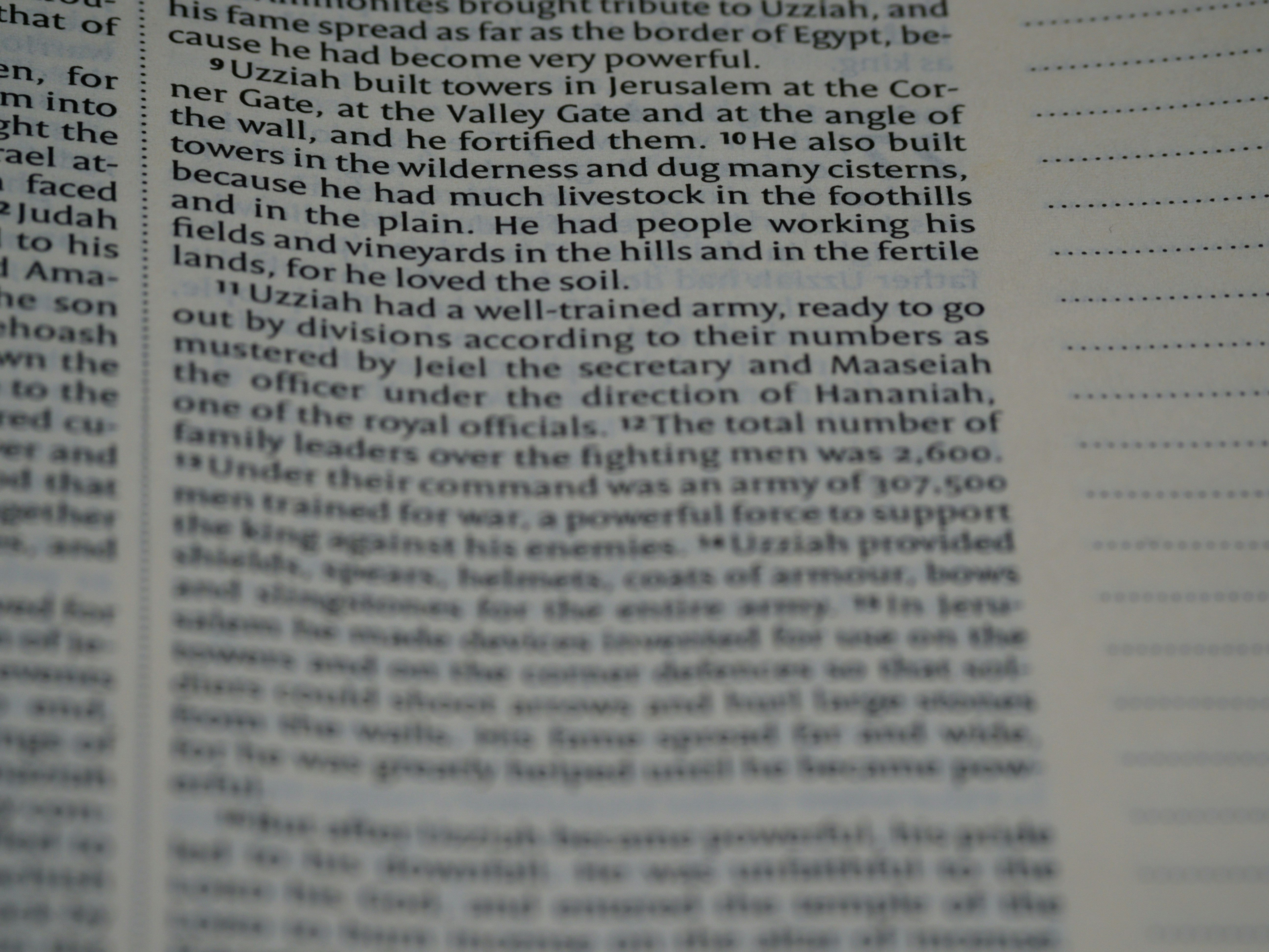 A Quiet Read: Blurred Newspaper Text Framing a Page Edge