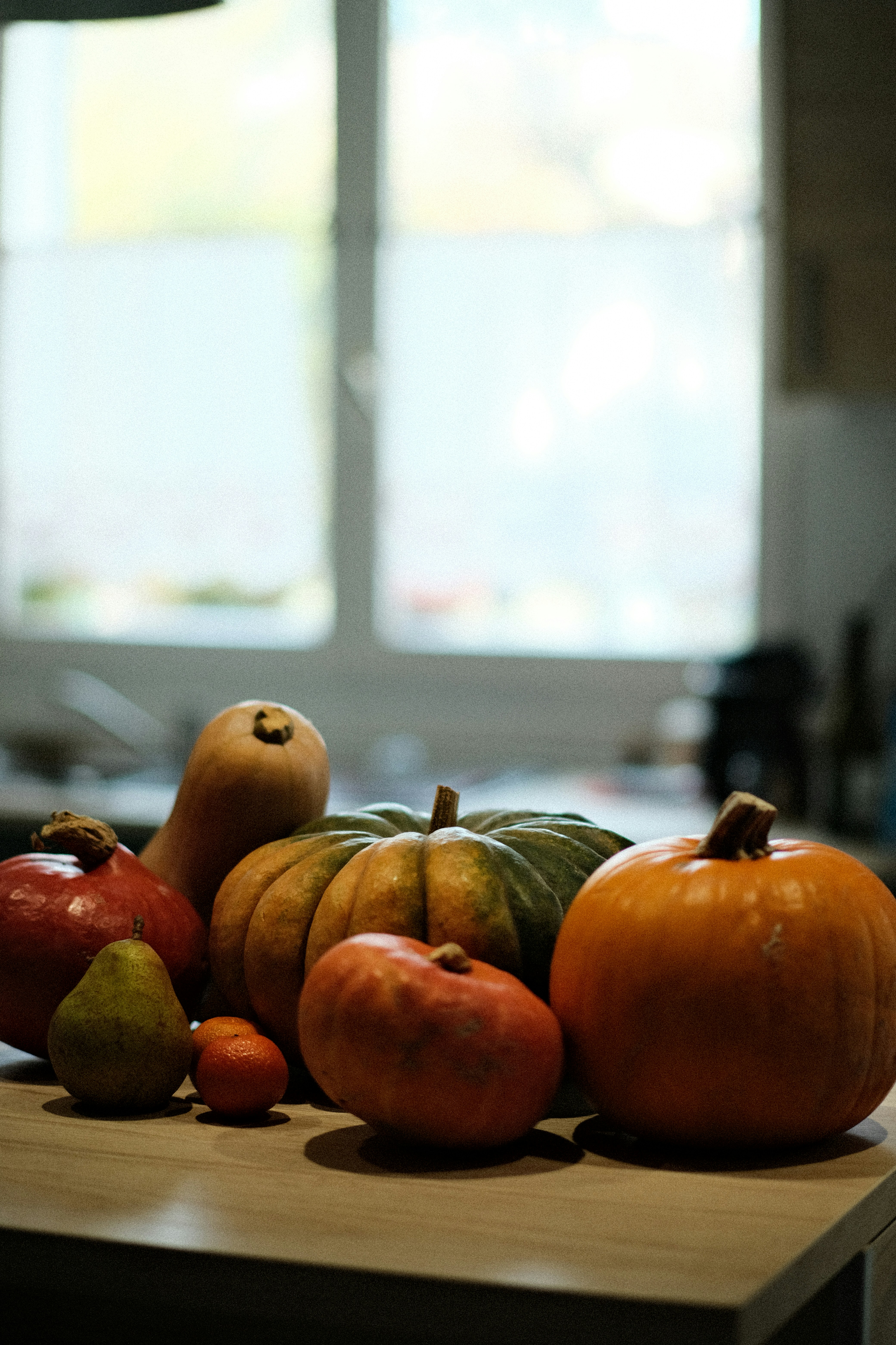 Autumn Quiet: A Still-Life Study of Pumpkins and Pears on a Sunlit Table