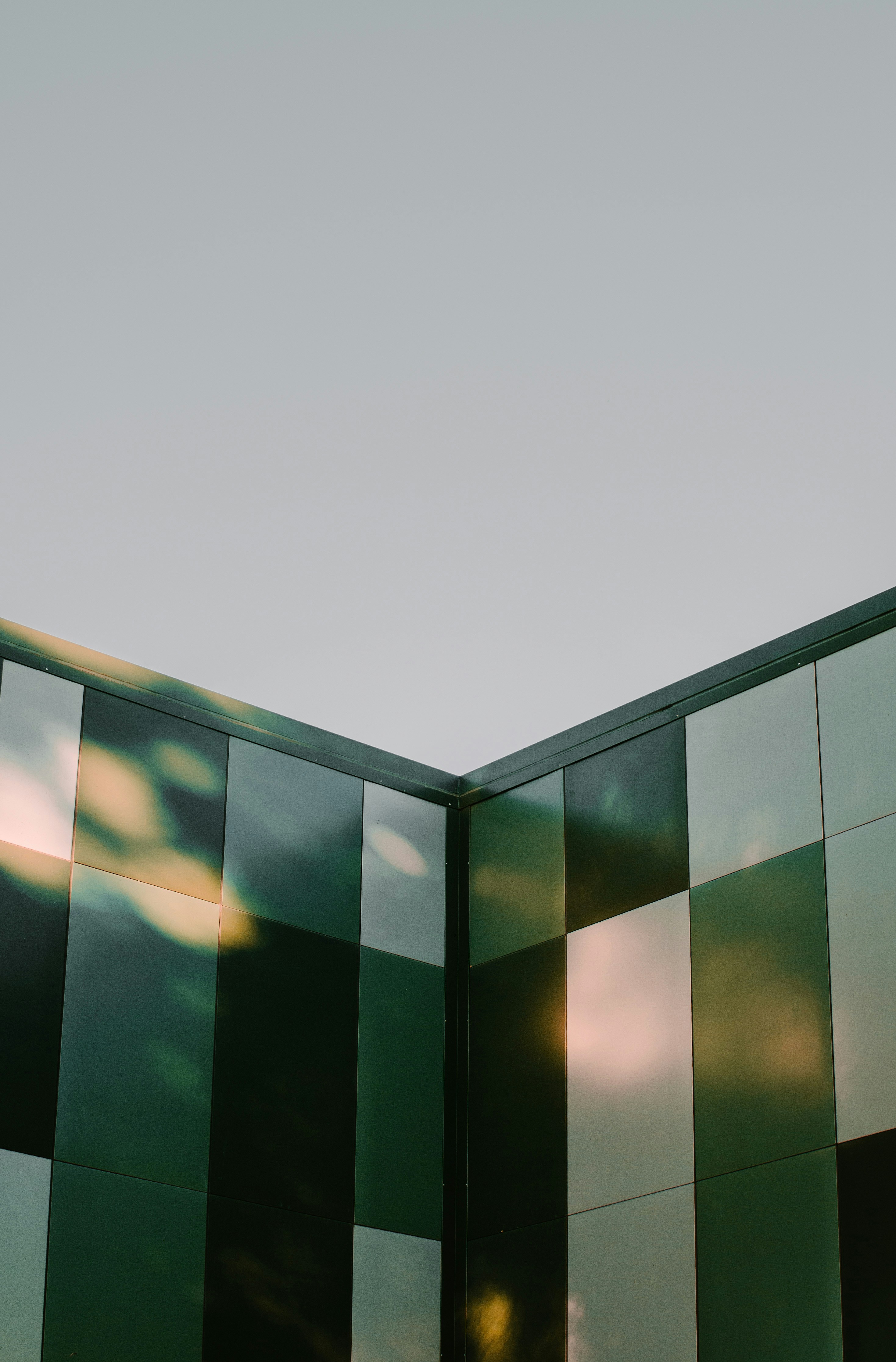 Corner Light: Checkerboard Facade Meeting the Sky
