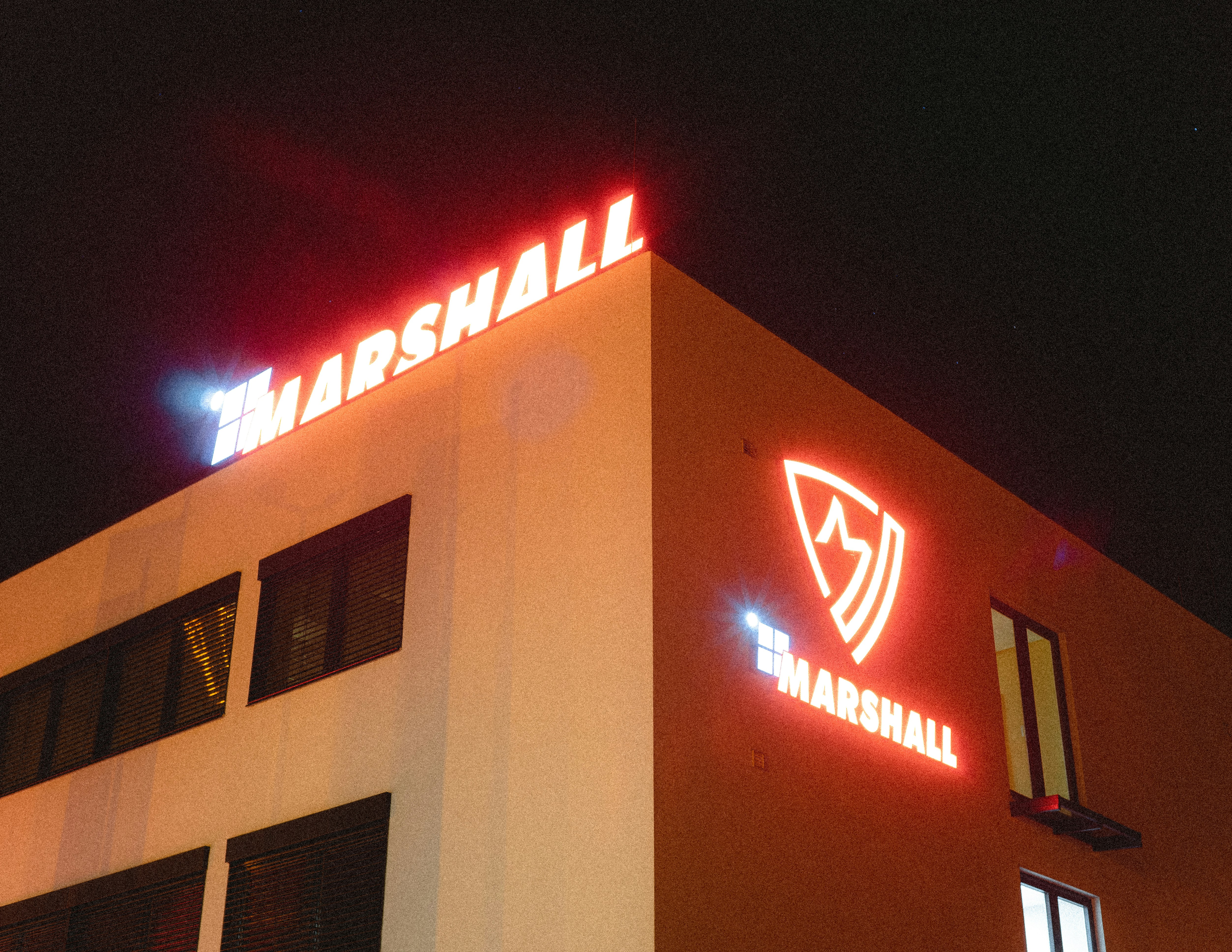 Neon Signage on a Corner Marshalls Building at Night
