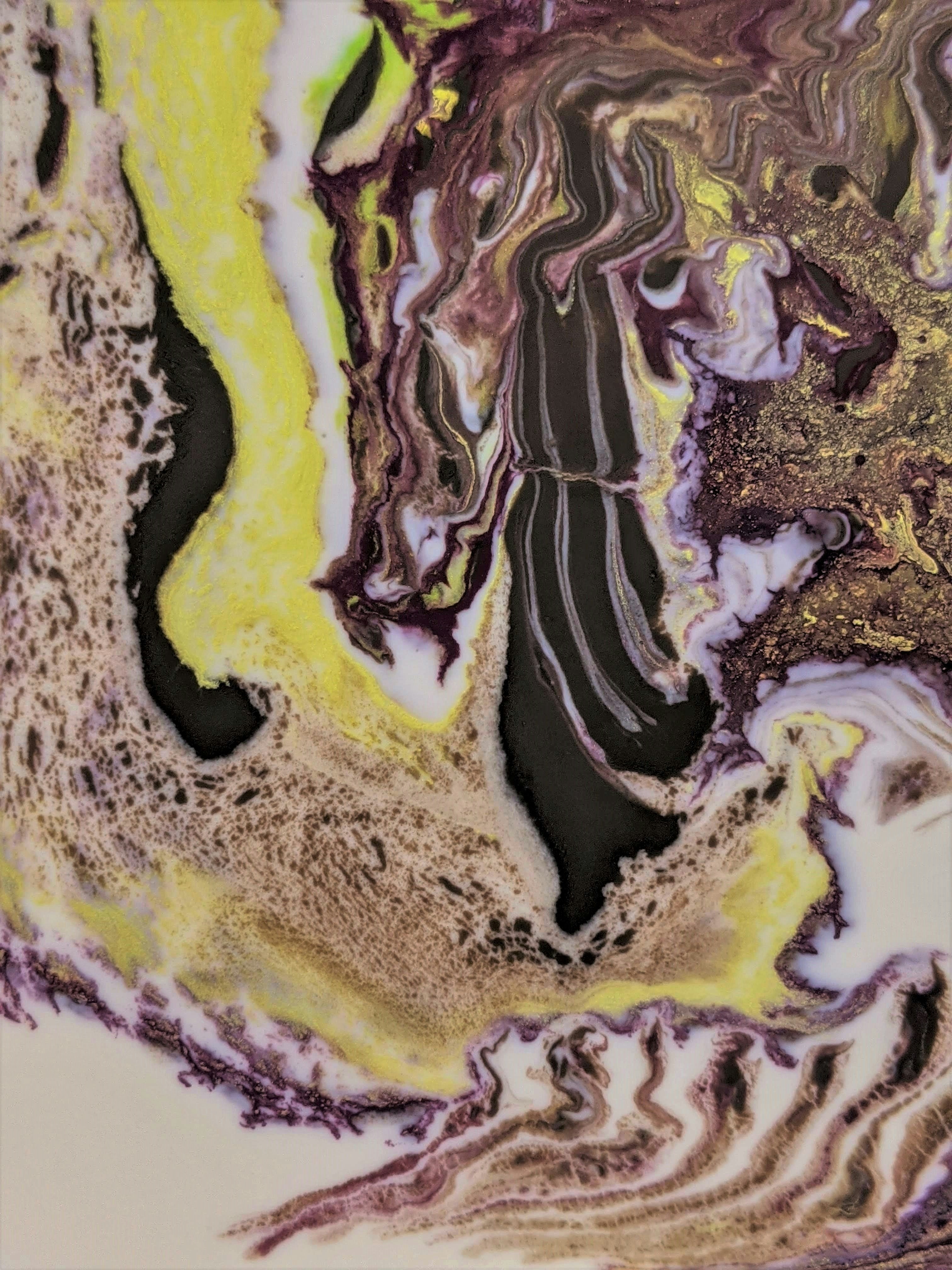 Abstract artwork featuring vibrant swirls of purple, yellow, and black, creating a dynamic interplay of colors and textures.