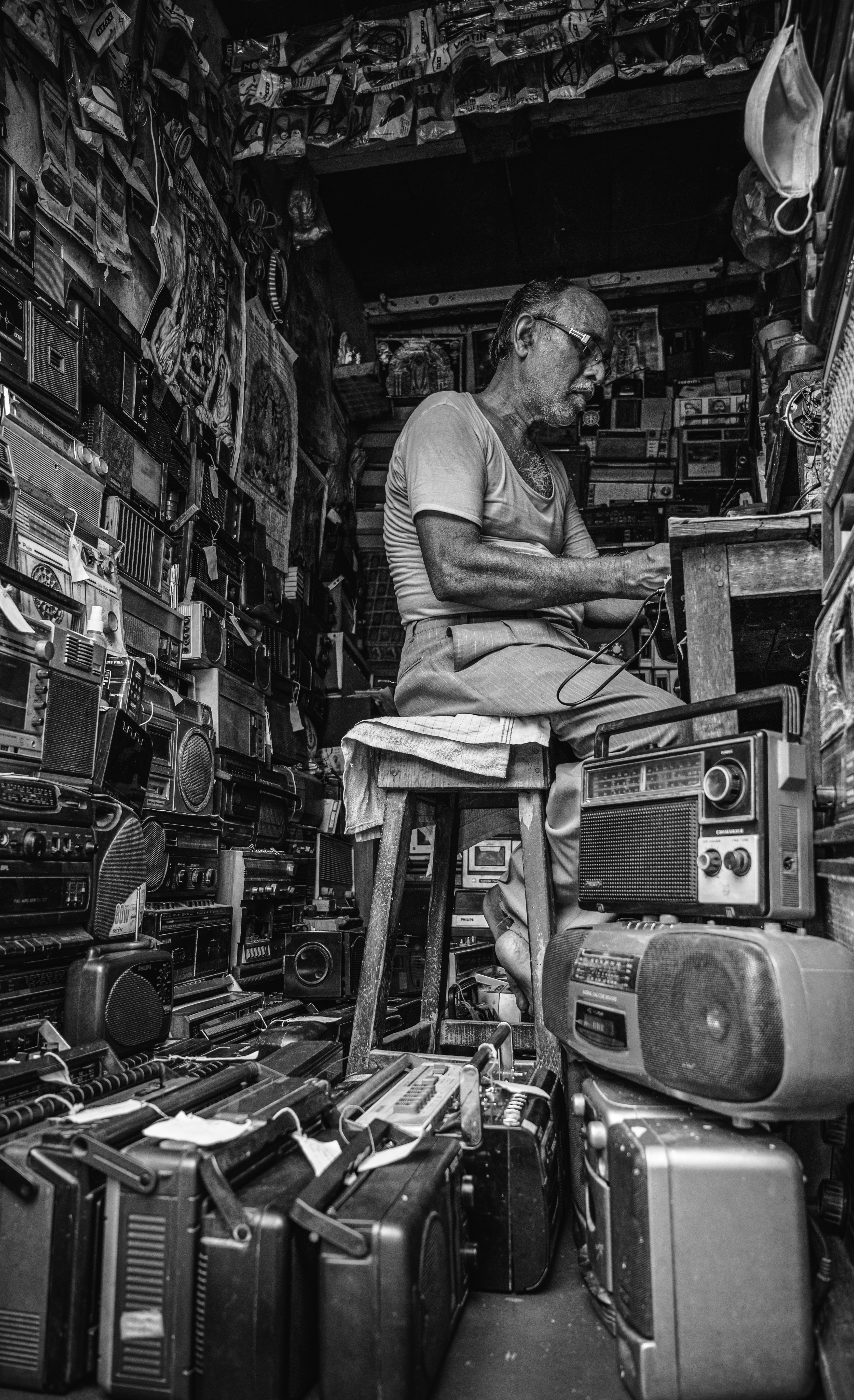 Benchbound: A solitary tinkerer amid a fortress of vintage electronics