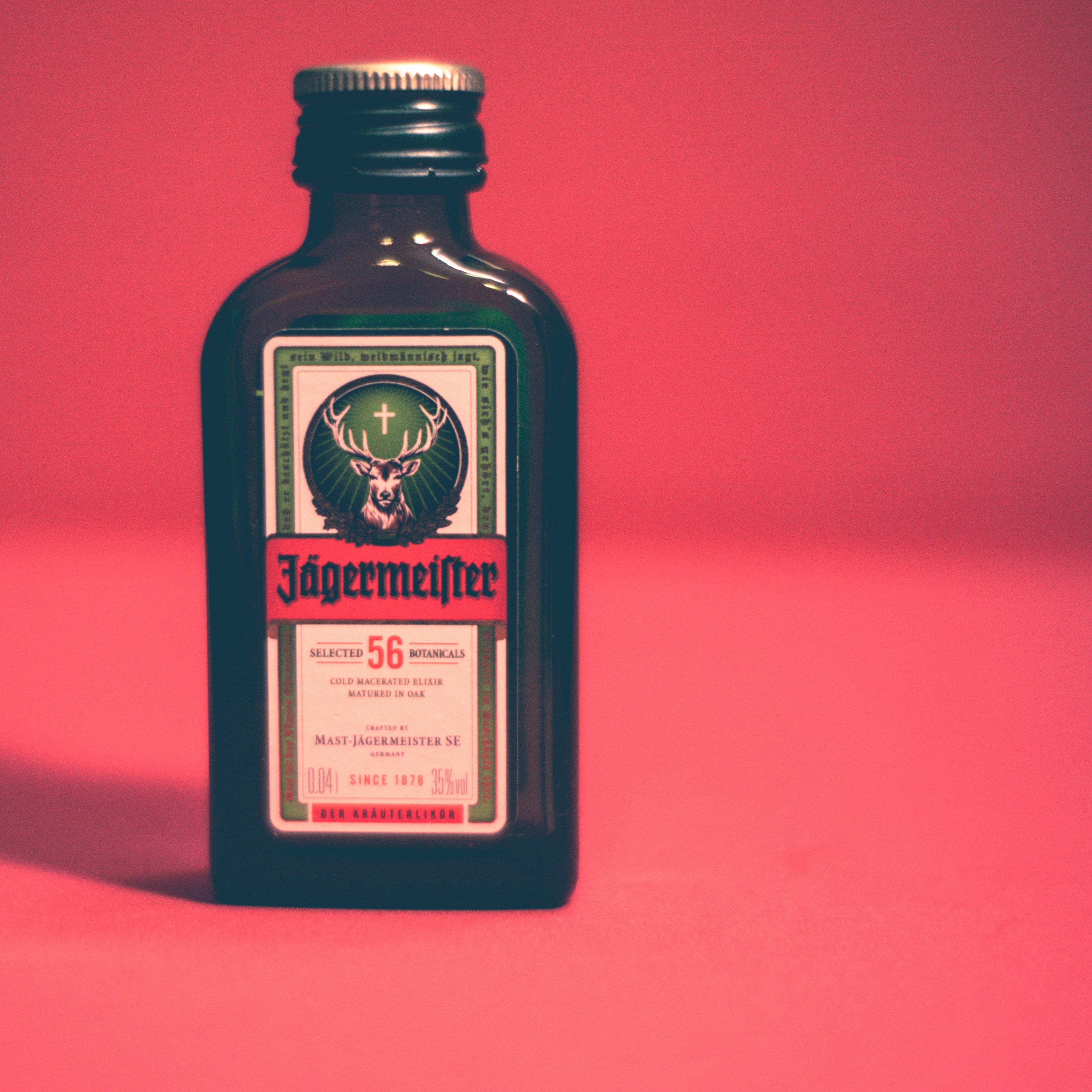 Crimson Focus: Jägermeister on a Minimal Pink Stage