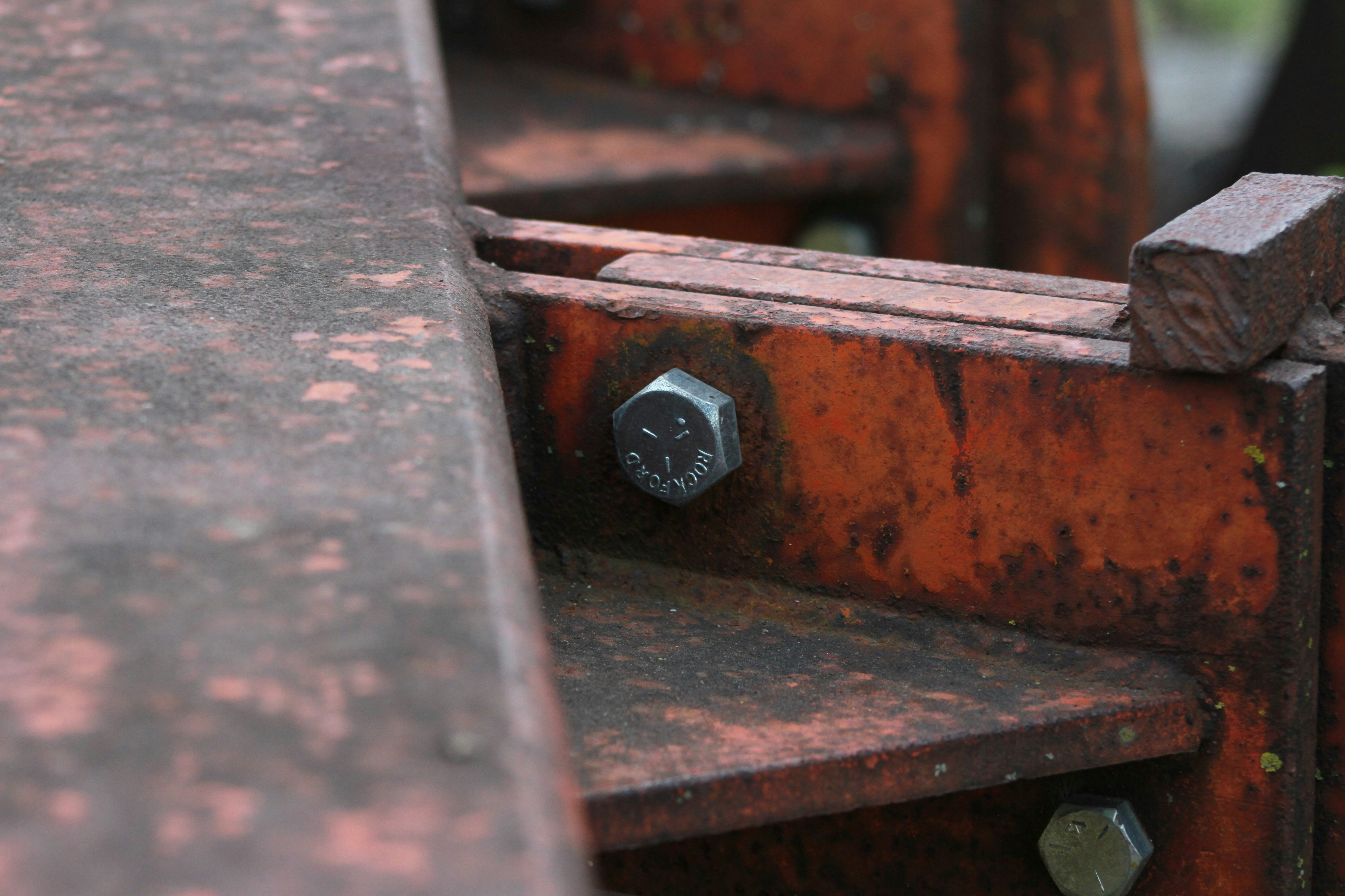 A close up of a rusted metal bench photo – Free Rust Image on Unsplash