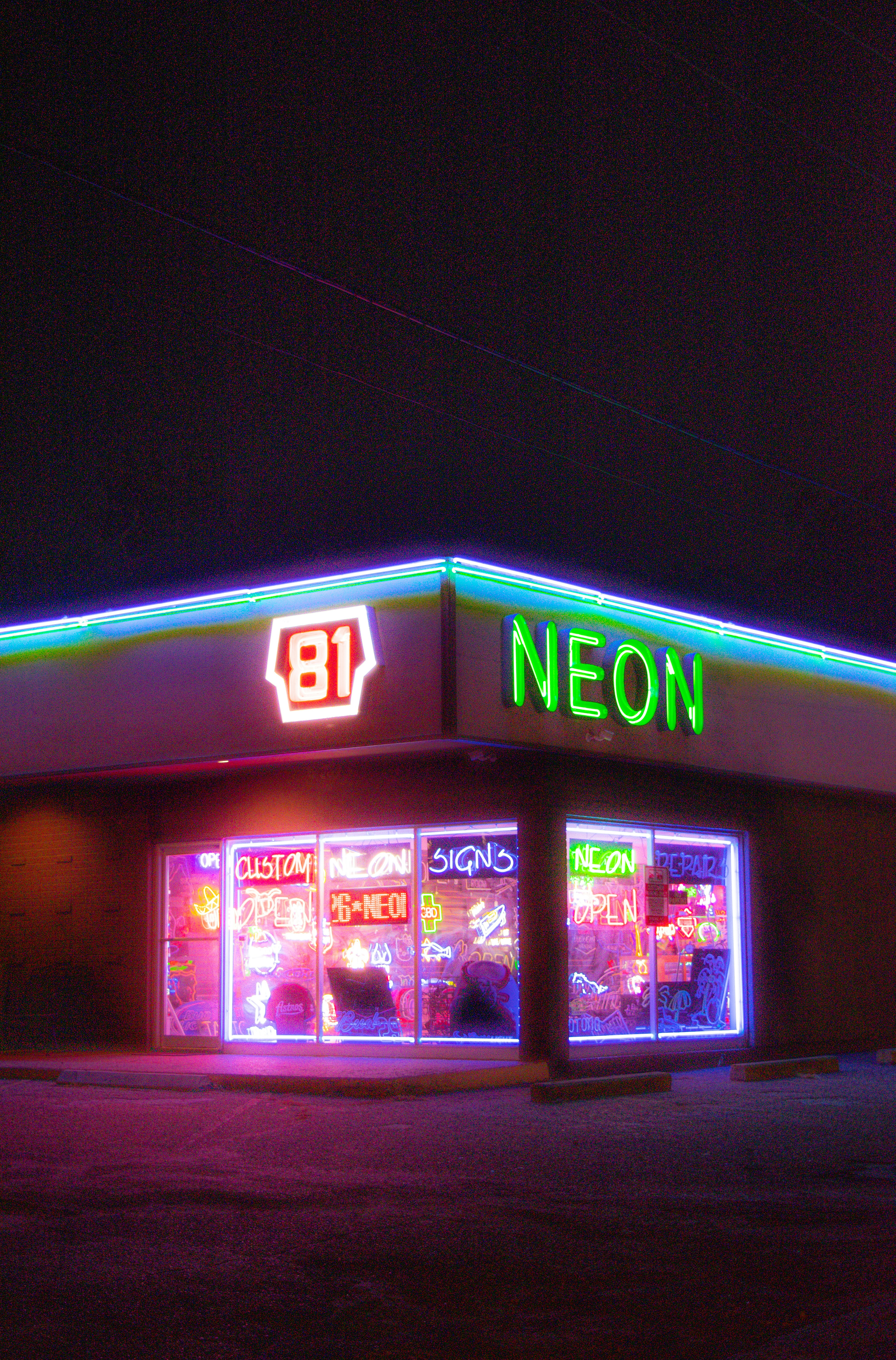 A neon lit neon store front at night photo – Free Neon Image on Unsplash