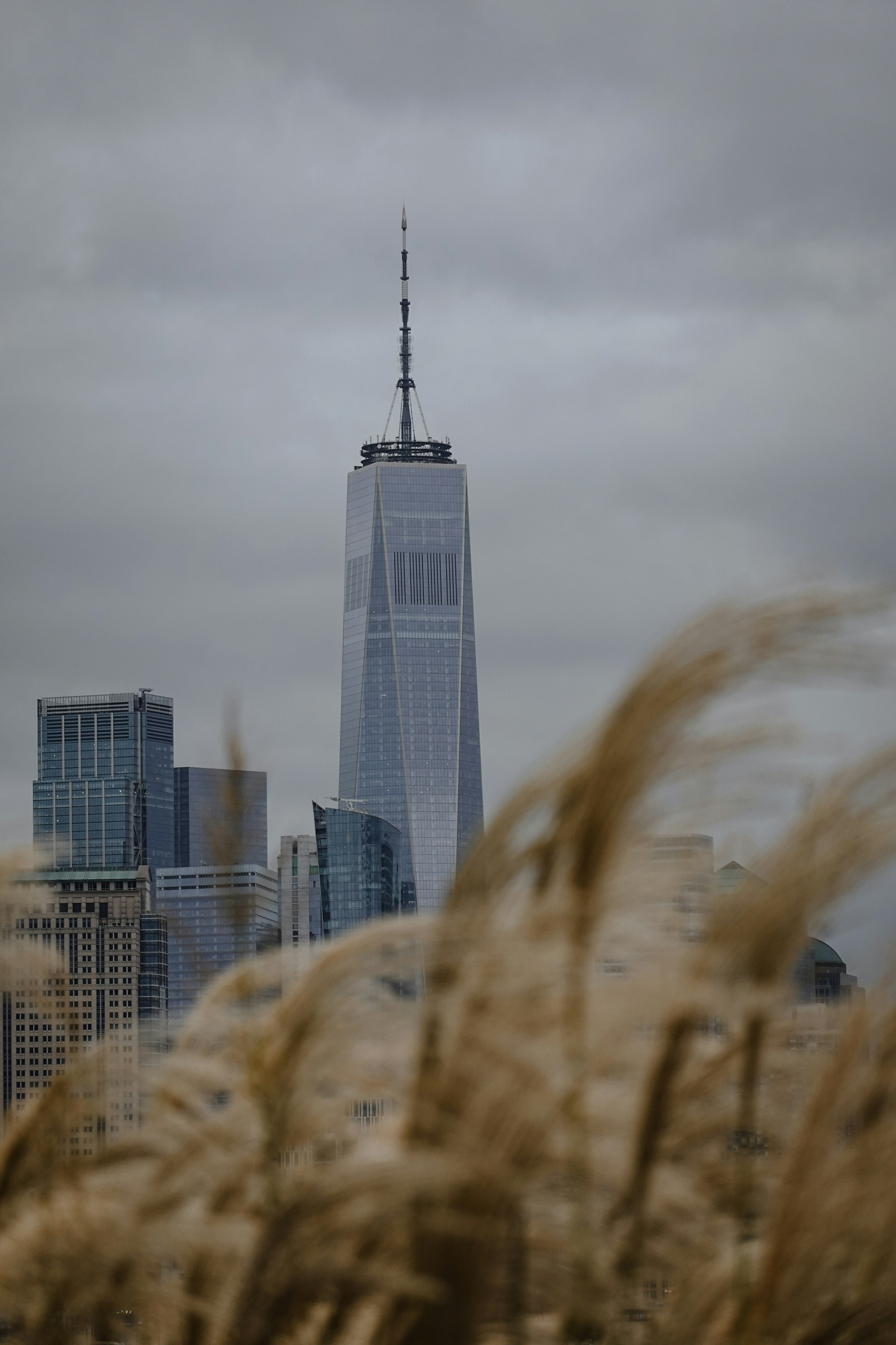 A very tall building with a very tall tower in the background photo ...