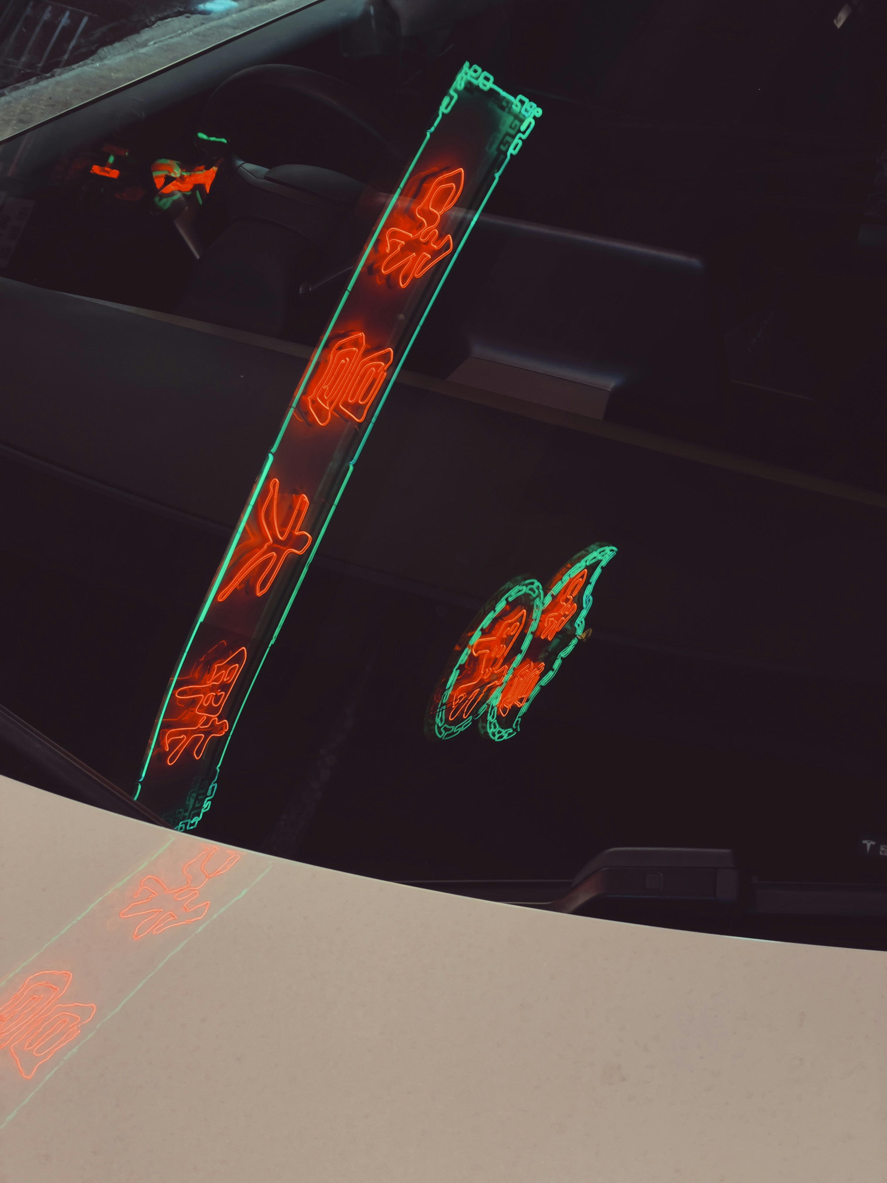 a close up of a car's dashboard with the lights on