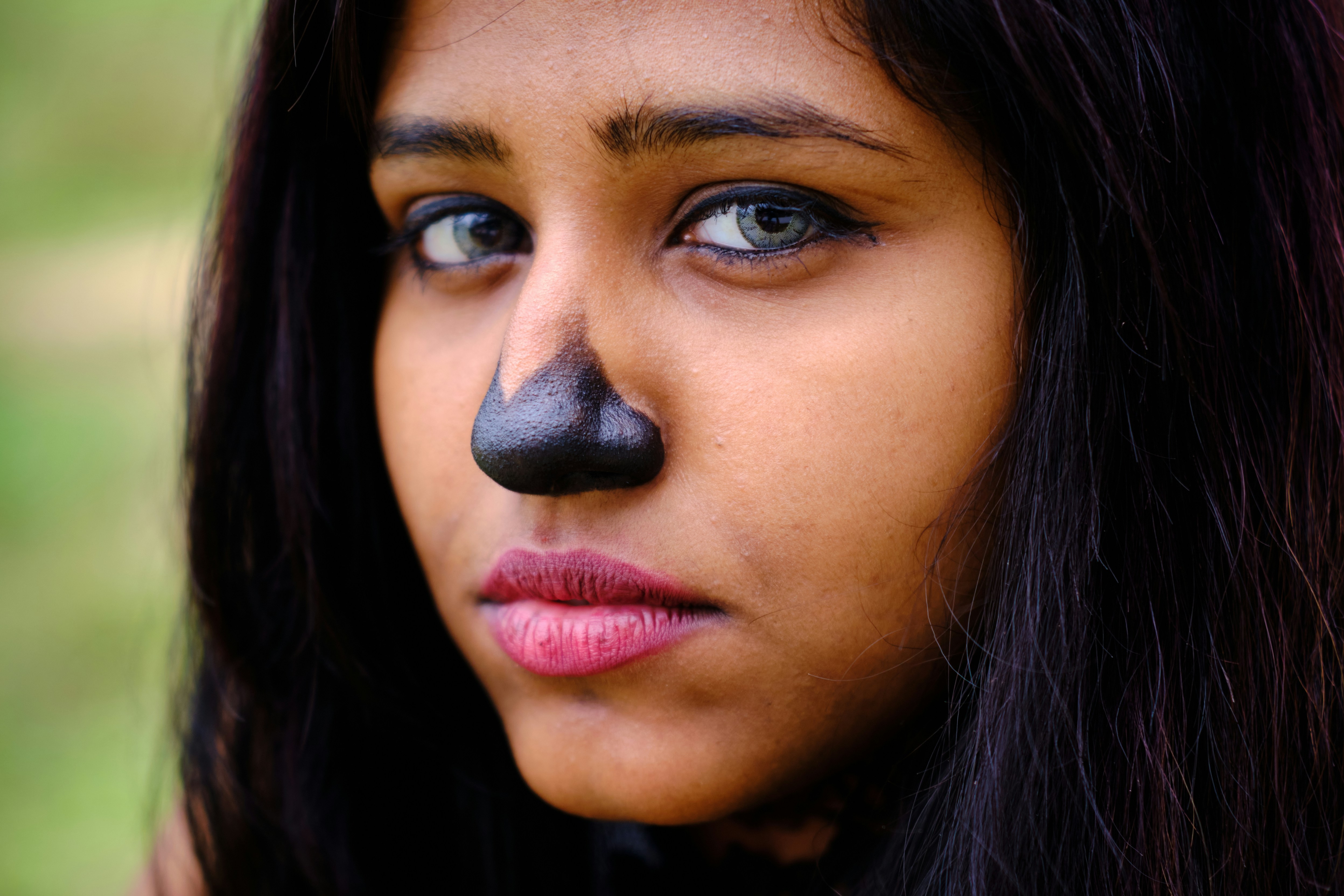 A woman with a fake nose and a fake nose photo – Free Model face Image ...