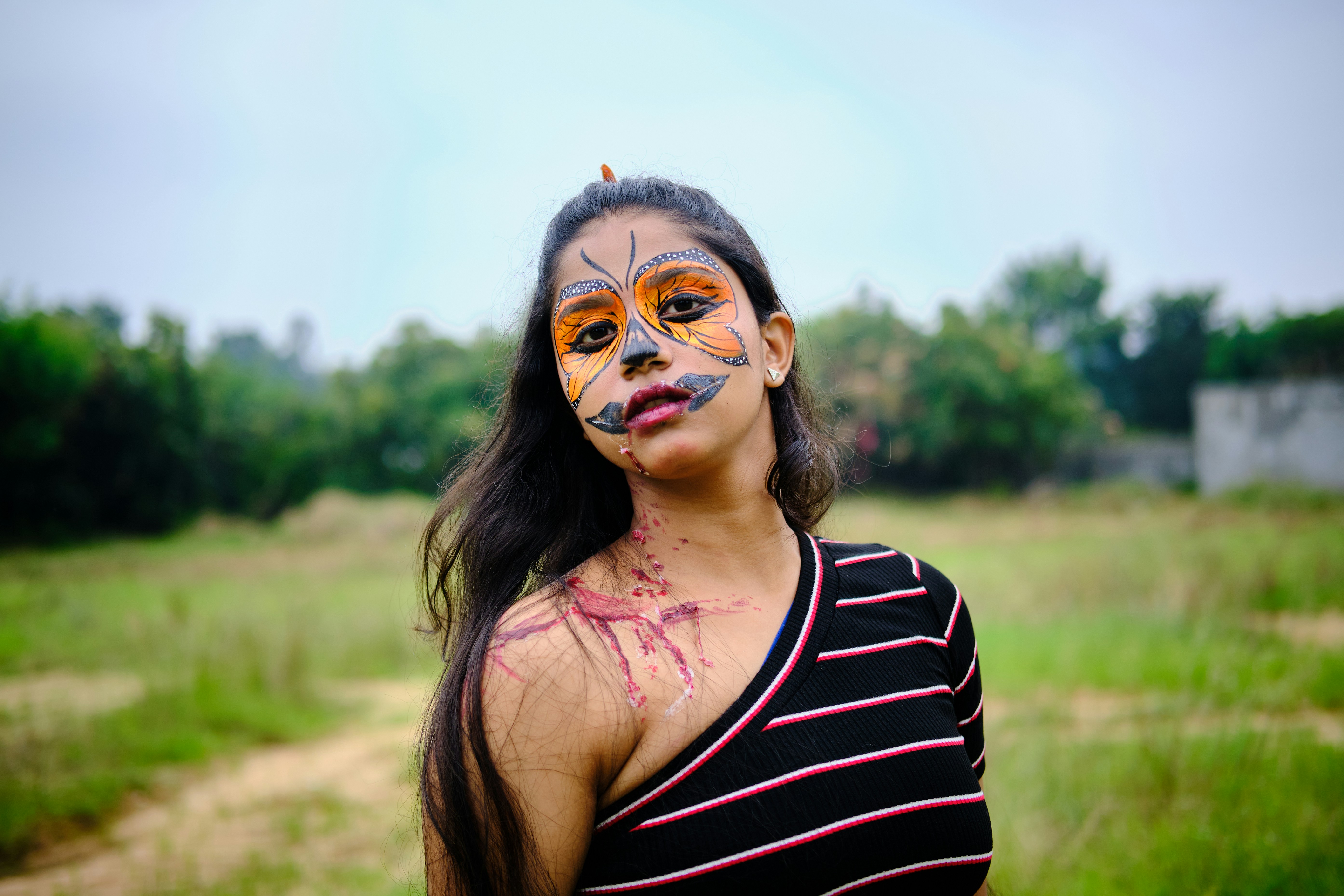 Face Painted in Field of Calm: A Portrait of Color and Contrast