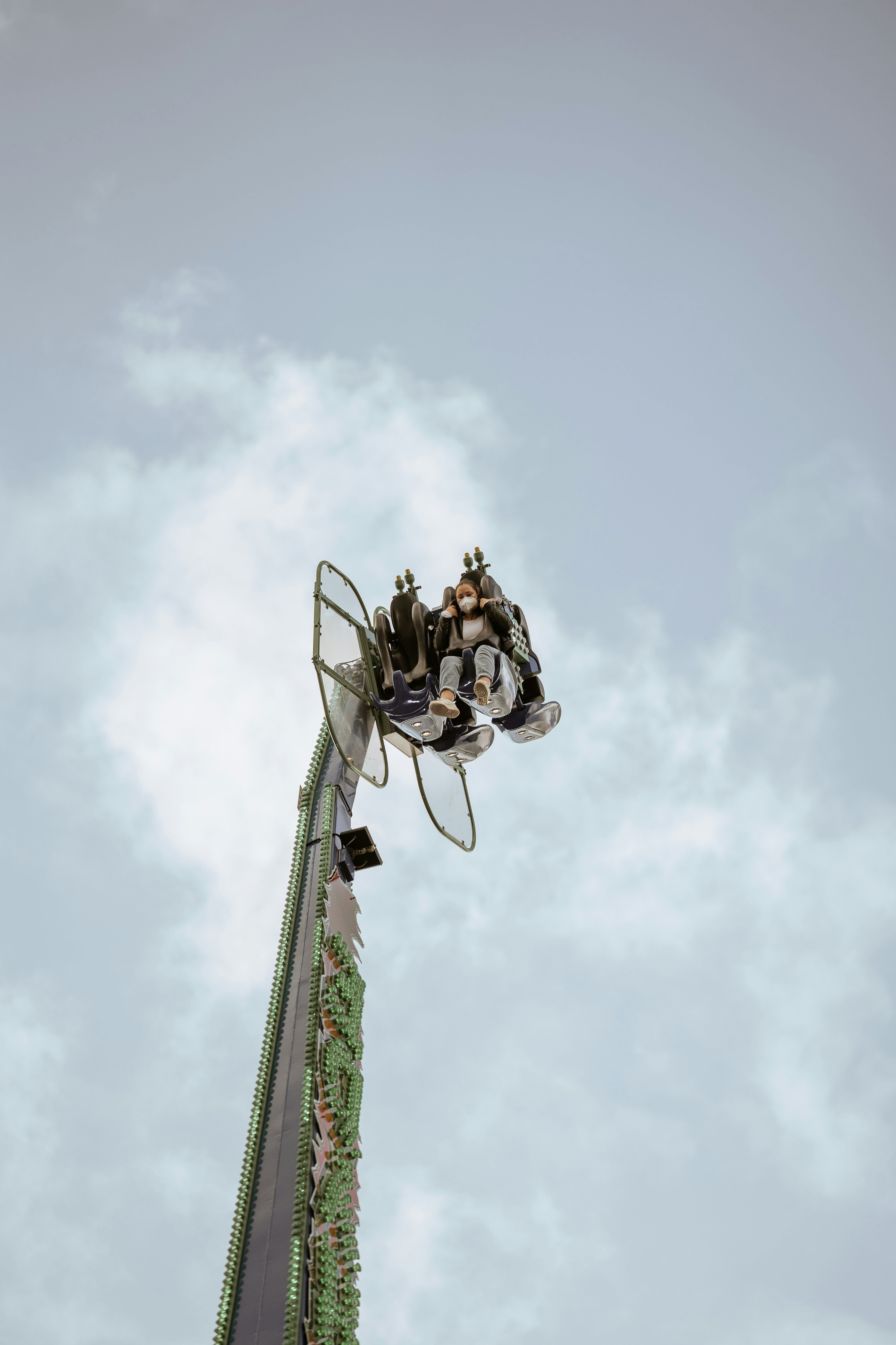 Top of the World: riders in the sky aboard a looping thrill ride