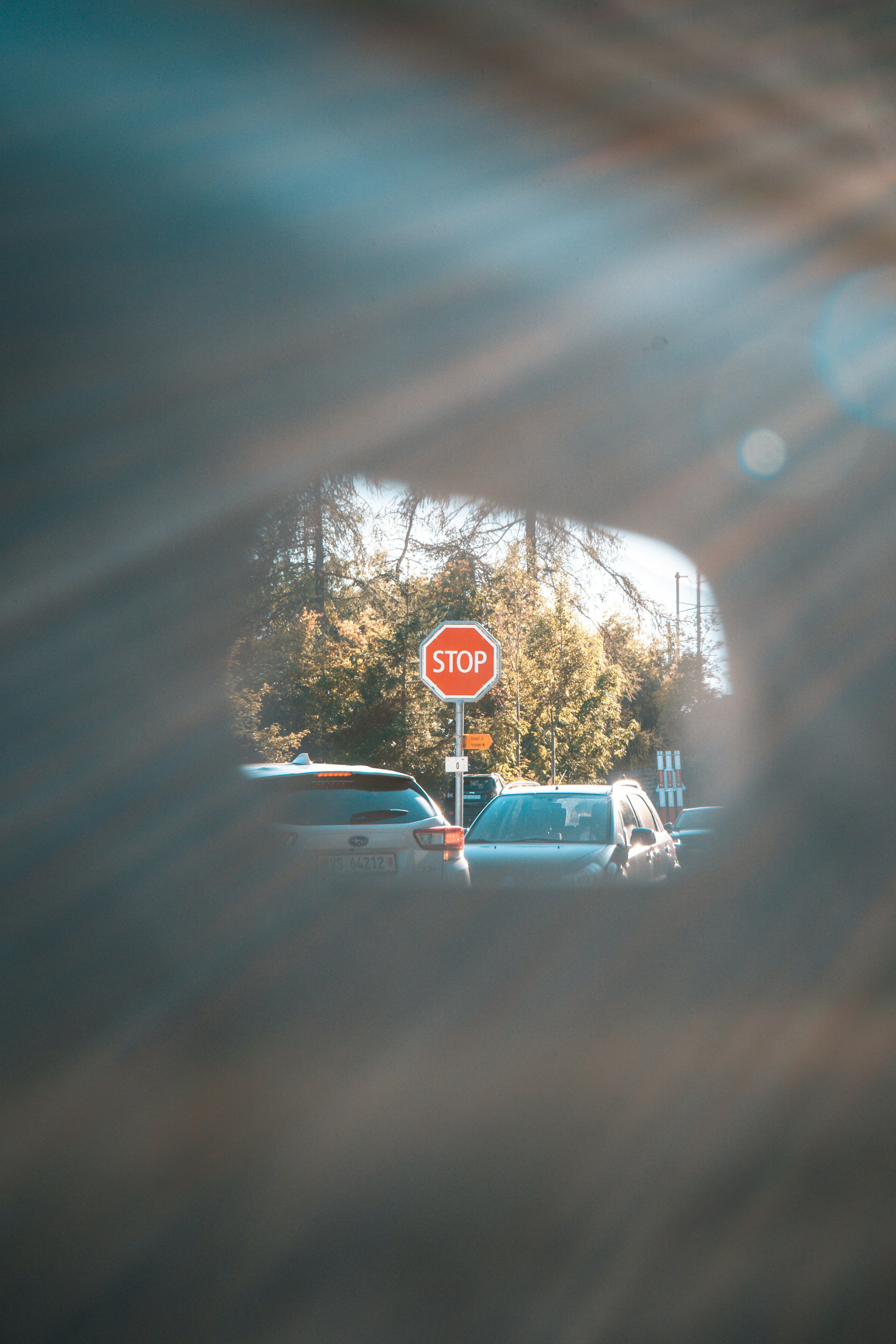 Through the Vignette: a Stop Sign Centered in Soft Light