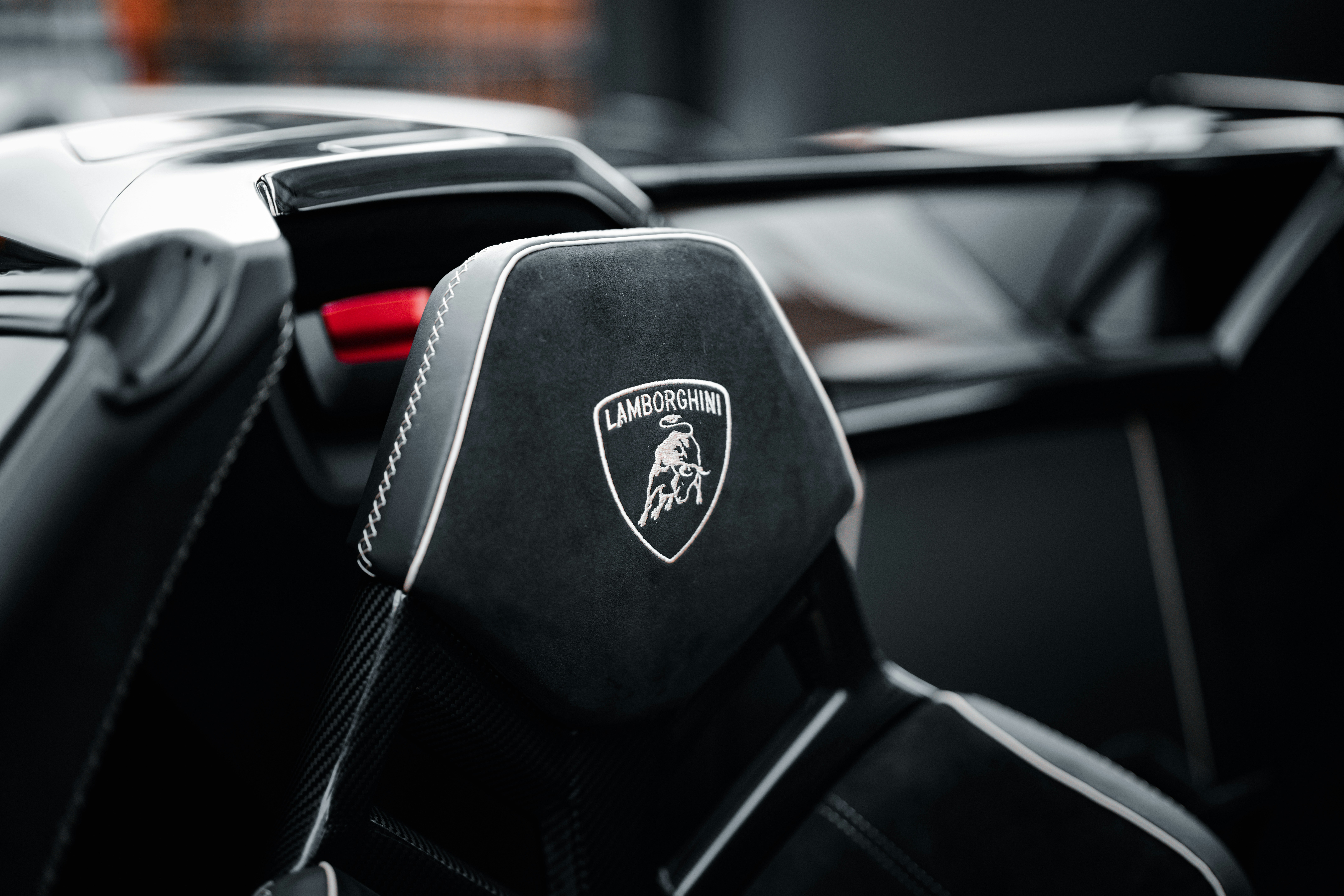 Lamborghini Seat Emblem: A Study in Leather, Stitching and Carbon Fiber