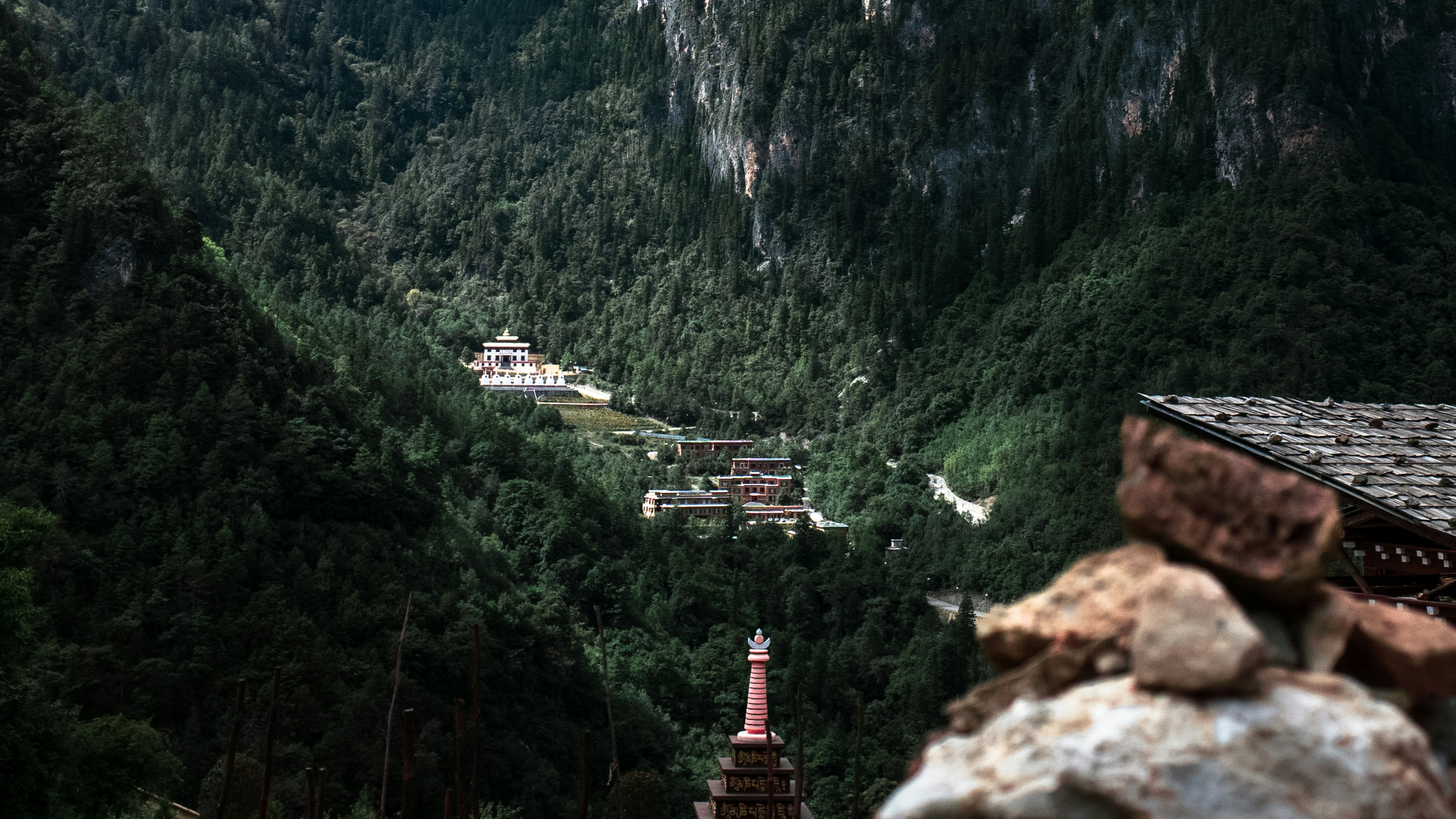 Pink Spire Over a Verdant Valley Village