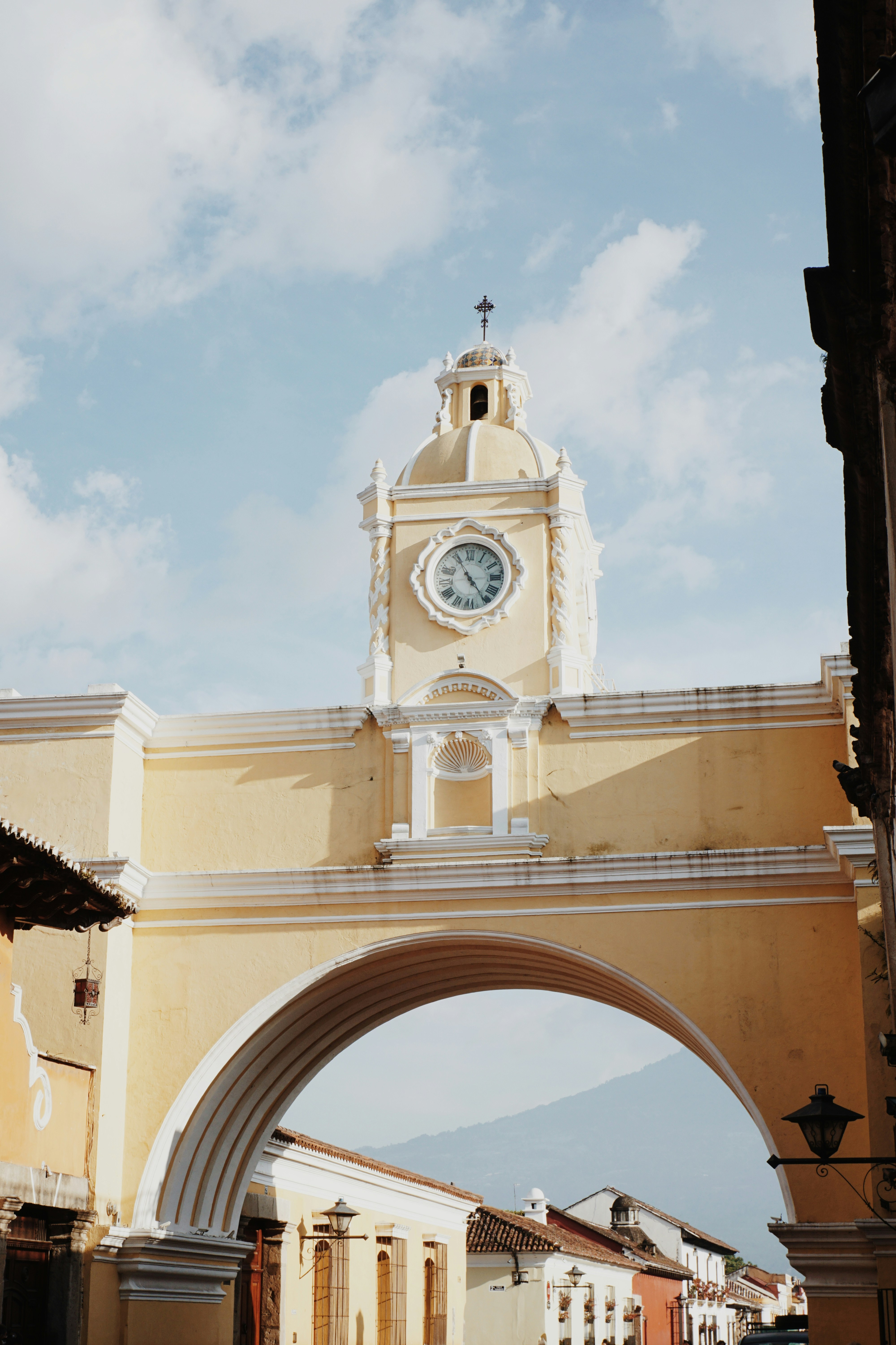 A clock tower on top of a building photo – Free Antigua guatemala Image ...