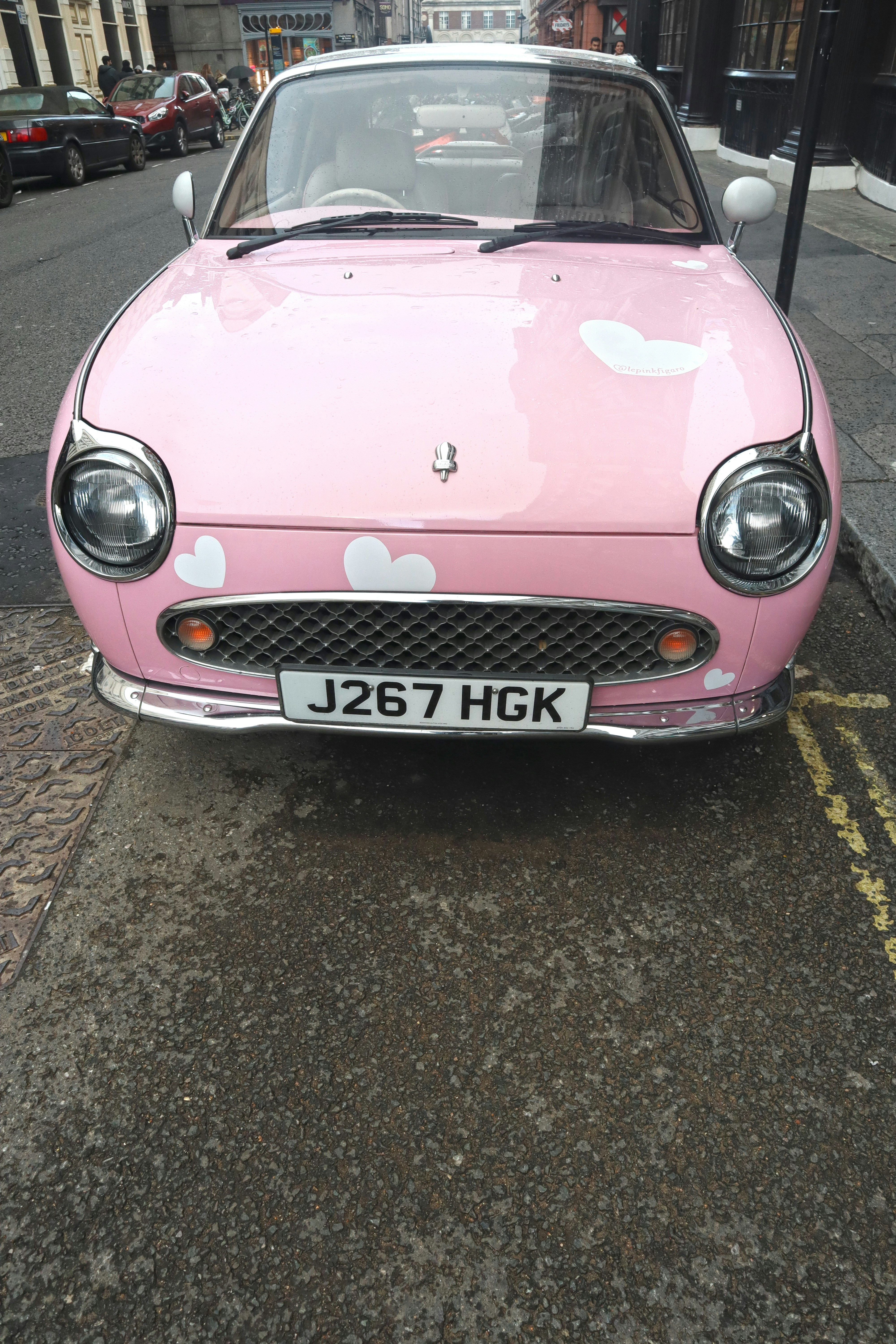 A pink car parked on the side of the road photo – Free Pink Image on ...