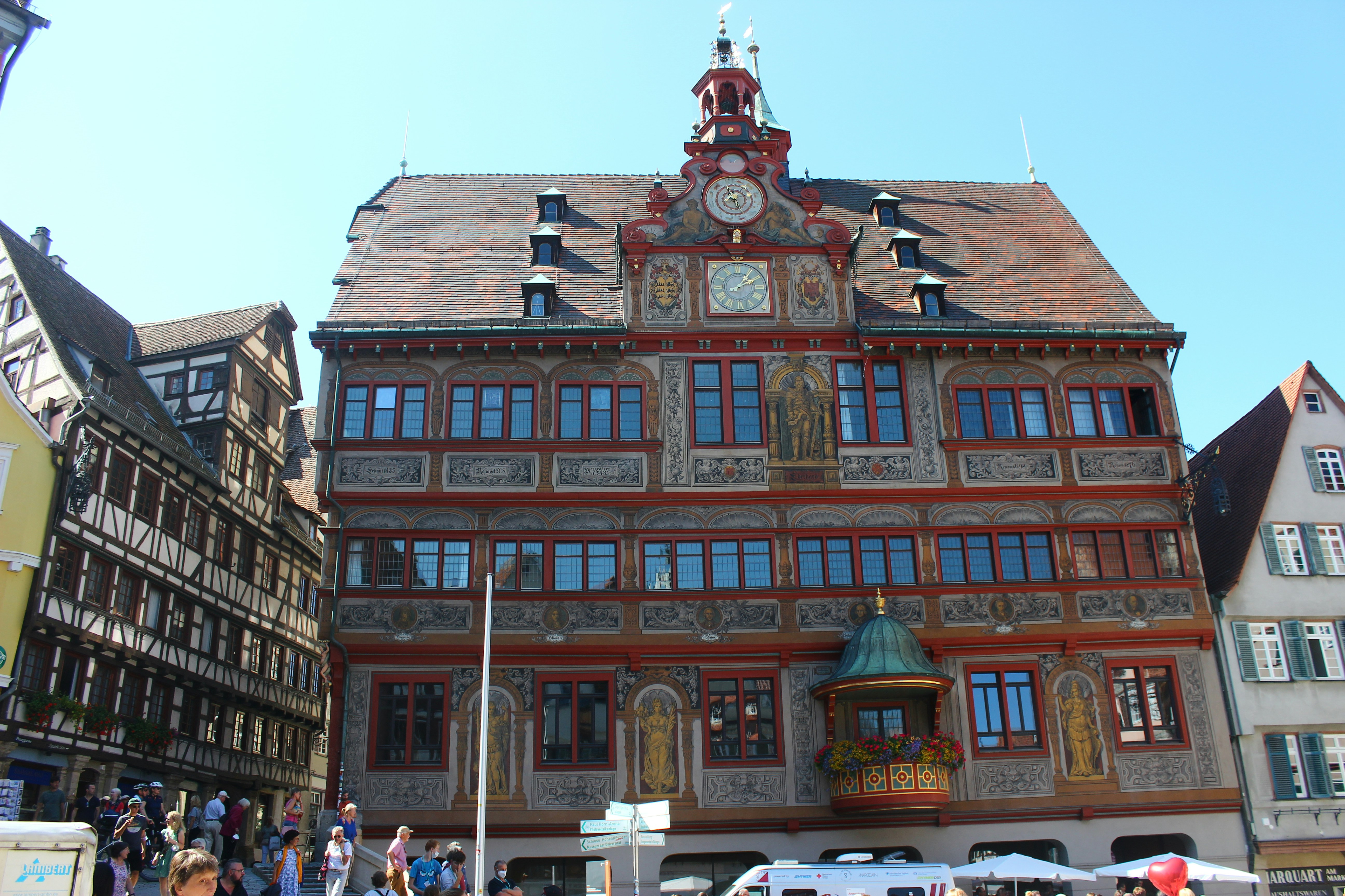 Ornate Town Hall Facade Crowns a Lively Square