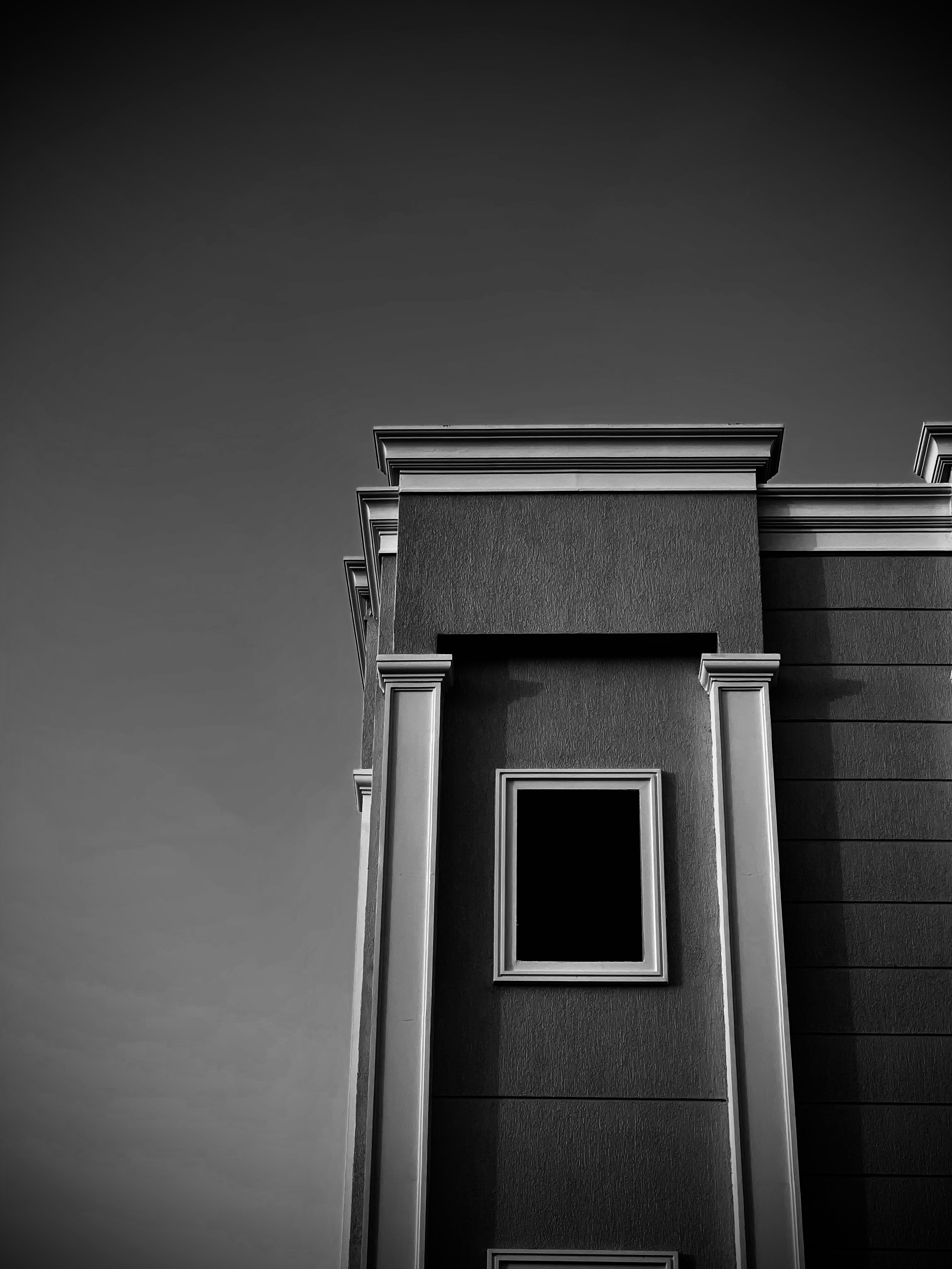 Framed Geometry on a Monochrome Facade: A Quiet Architectural Study
