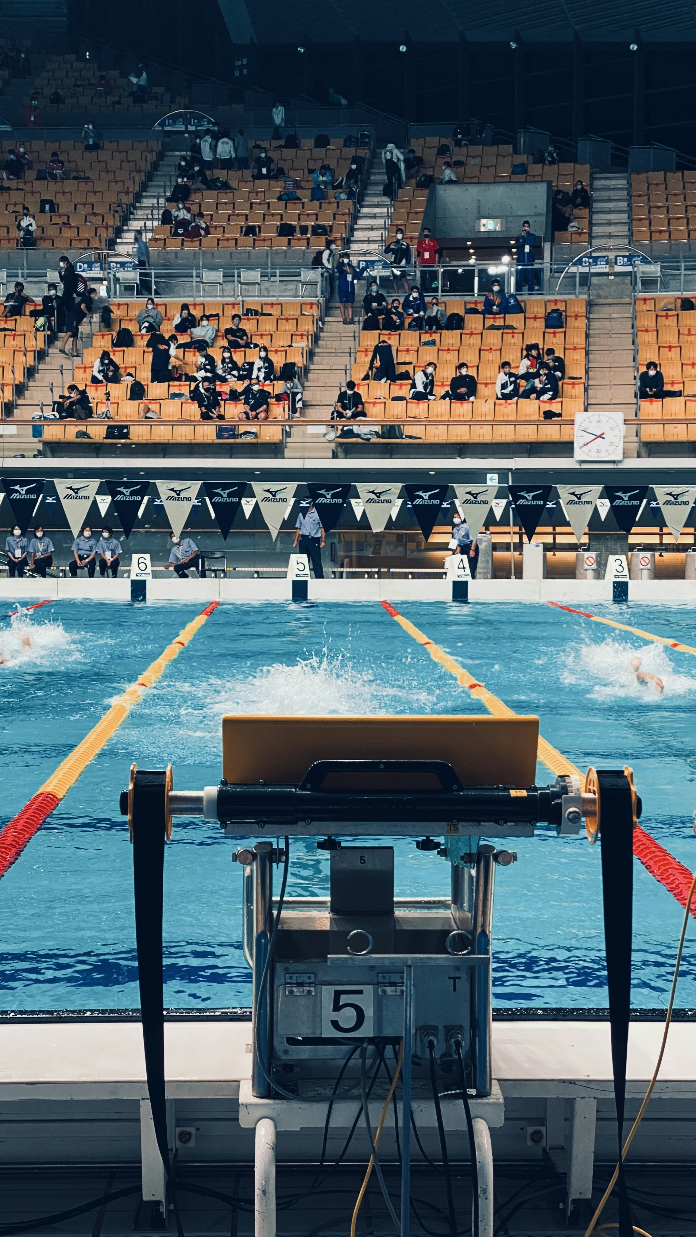 From behind a starting block at a pool in Tokyo
