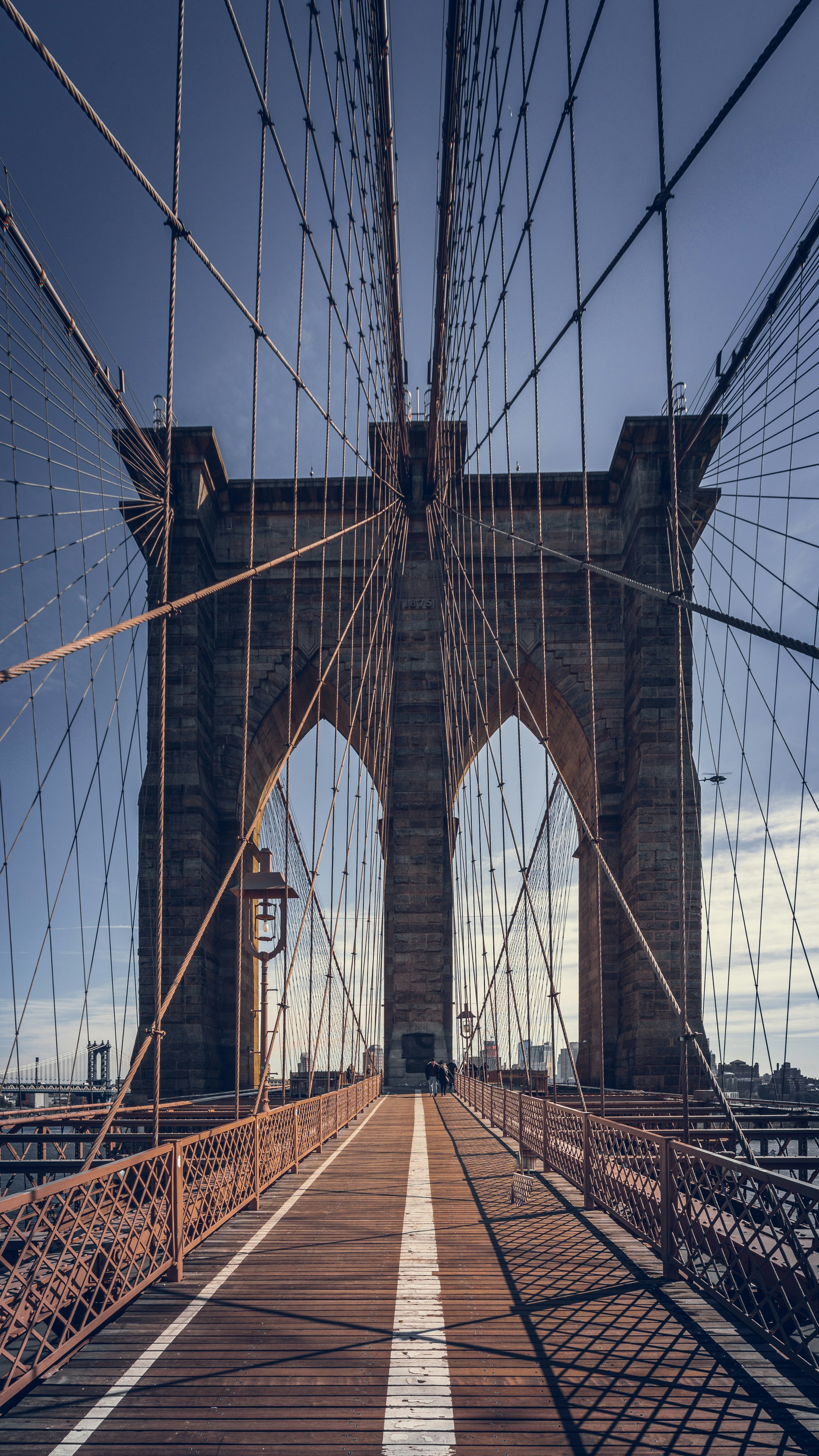 Vertical Lines and Stone Arches: A Piercing Walk Across the Bridge