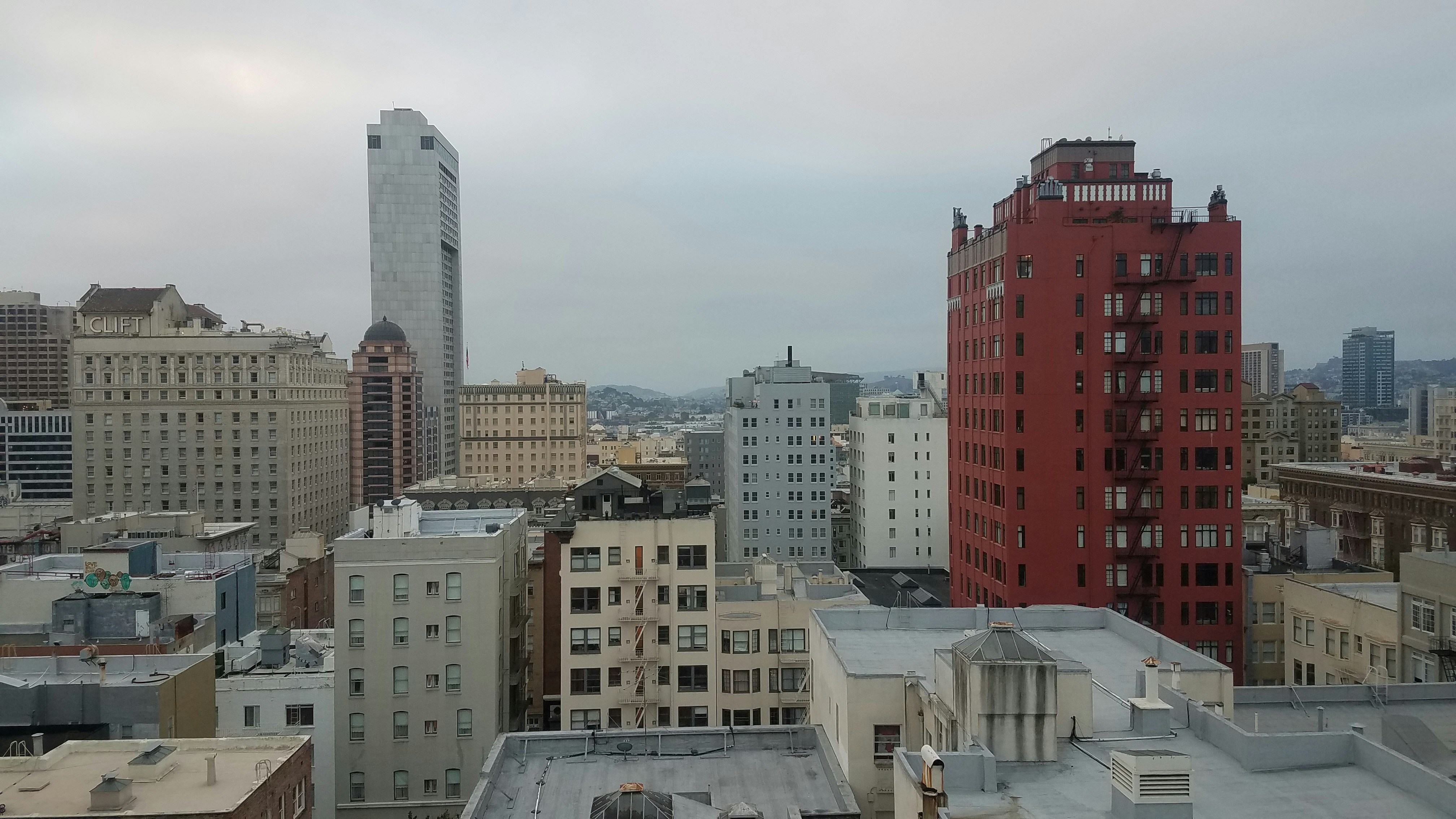 A view of a city with tall buildings photo – Free High rise Image on ...