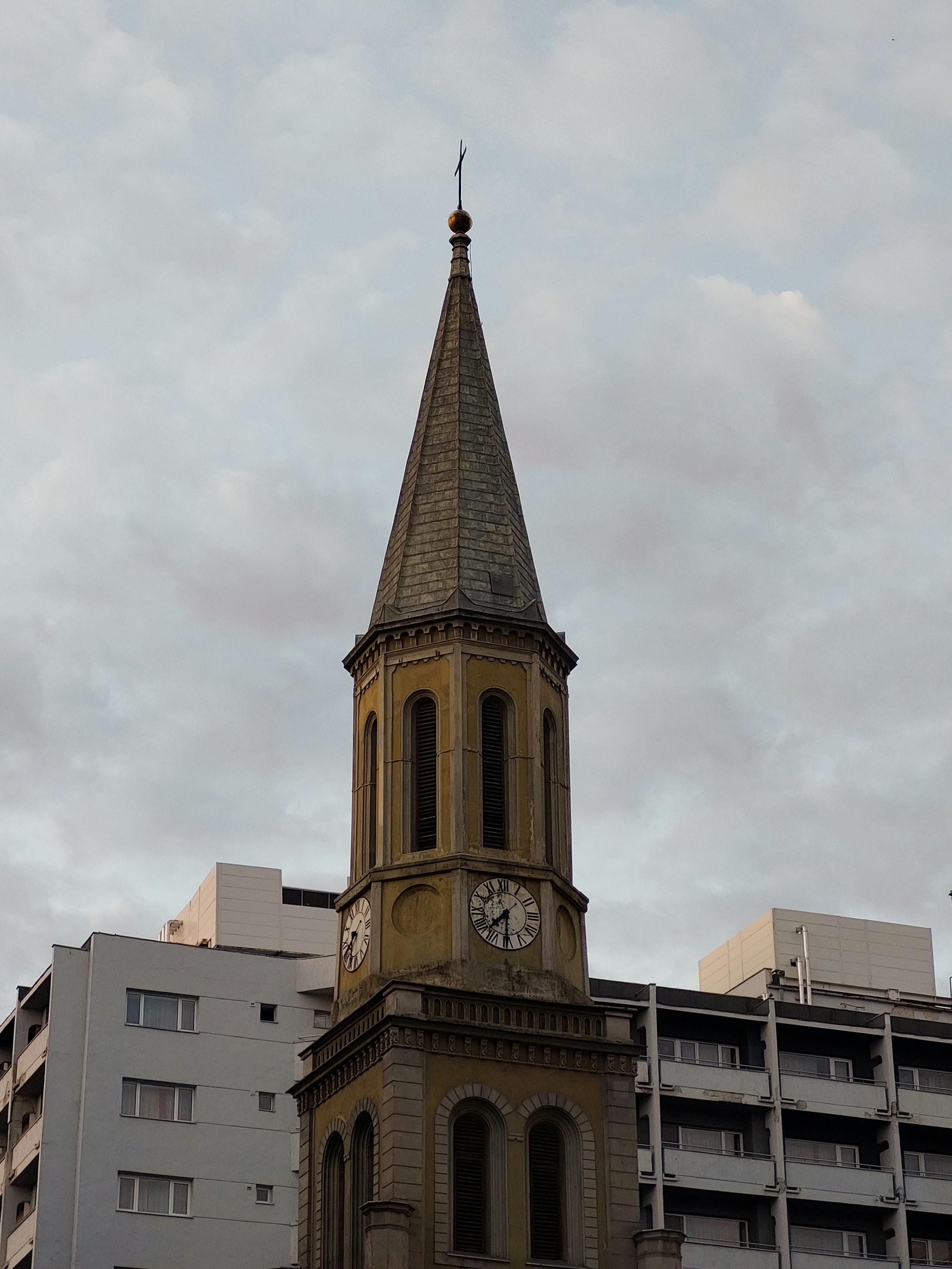 A tall tower with a clock on the top of it photo – Free Bucharest Image ...