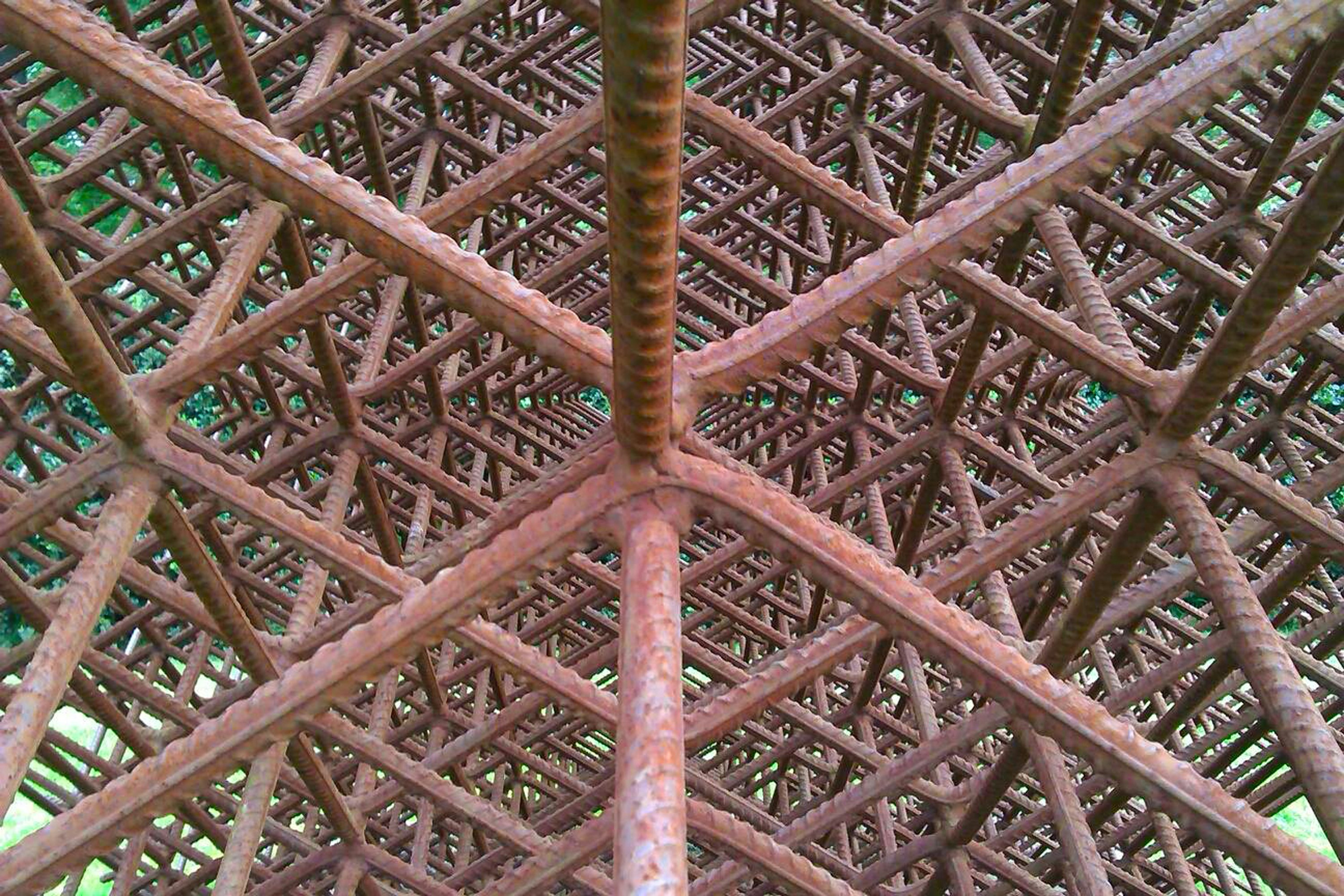 A close up view of a structure made out of sticks photo – Free Pattern ...