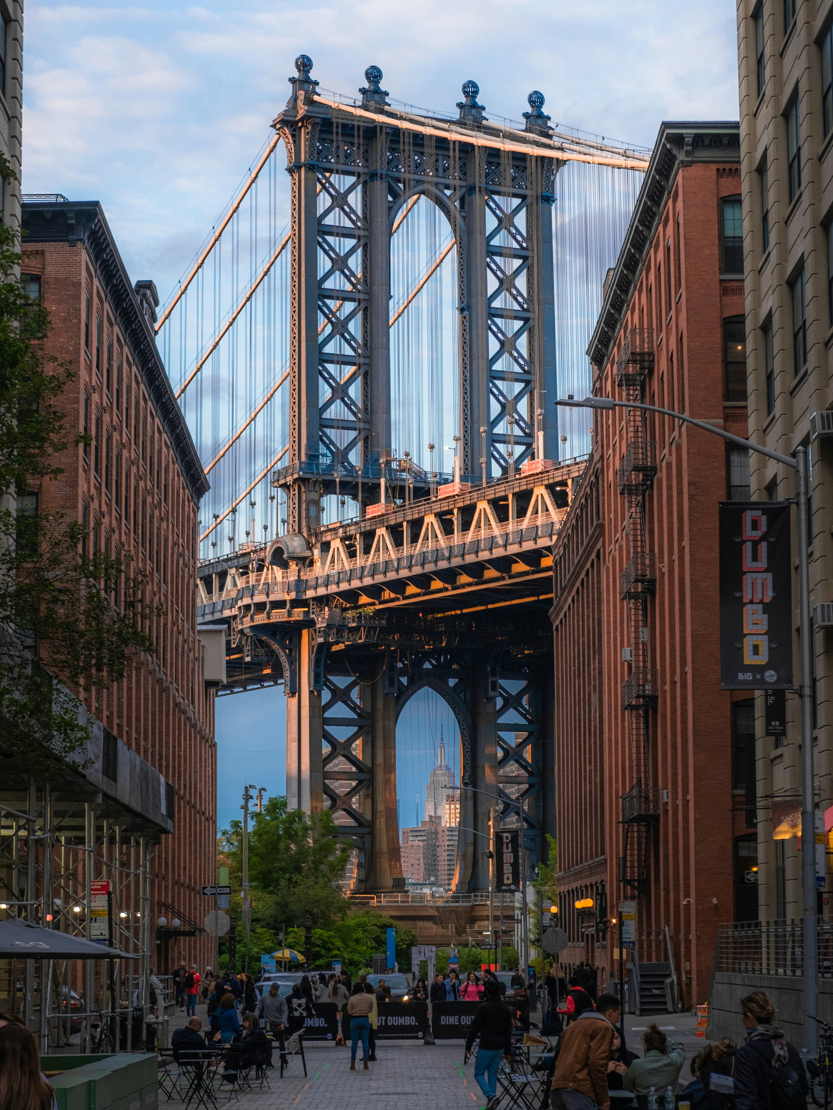 A large bridge spanning over a city street photo – Free Dumbo Image on ...