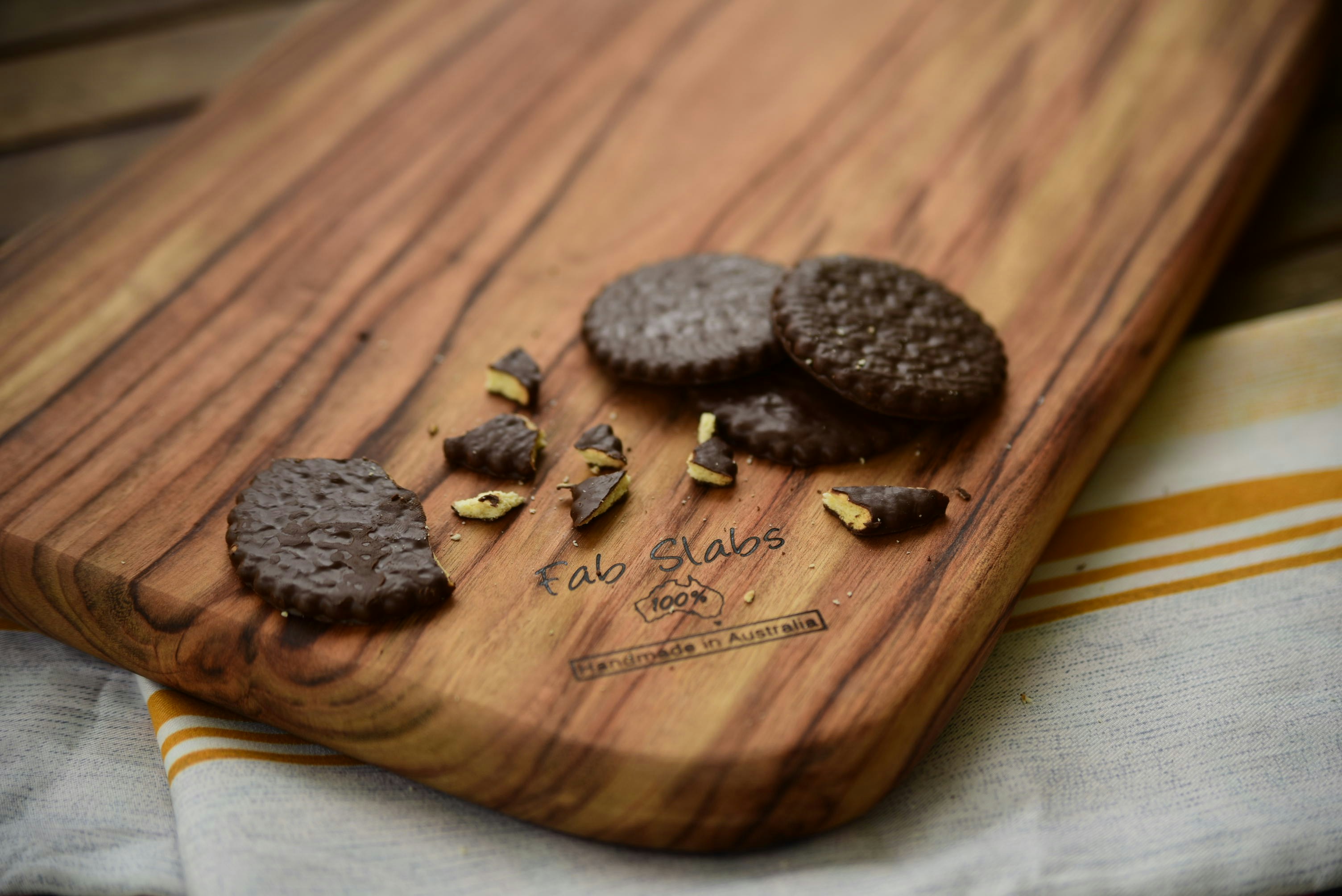 Caramelized Chocolate Crisp on a Stained Wood Board