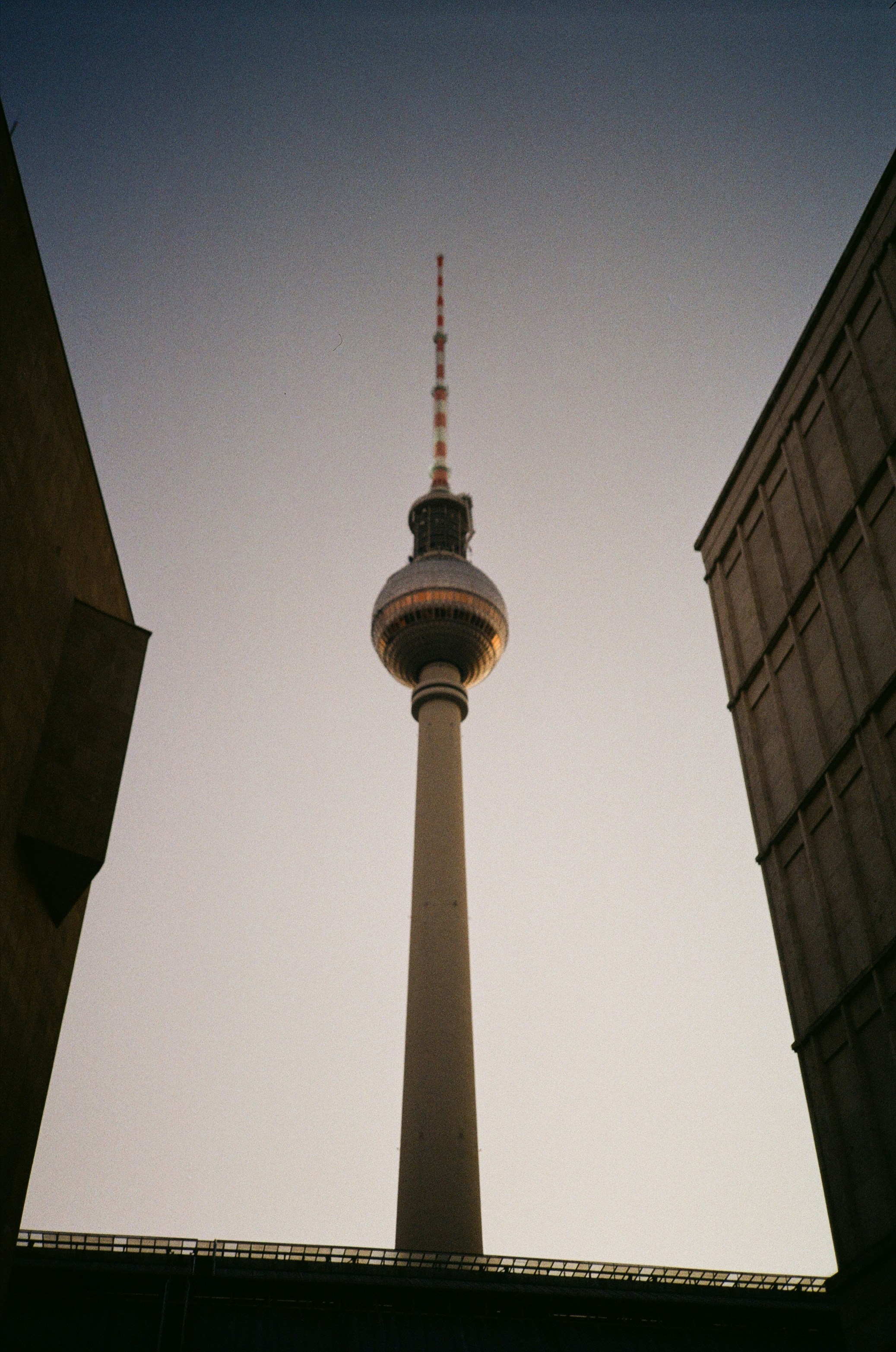a very tall tower towering over a city