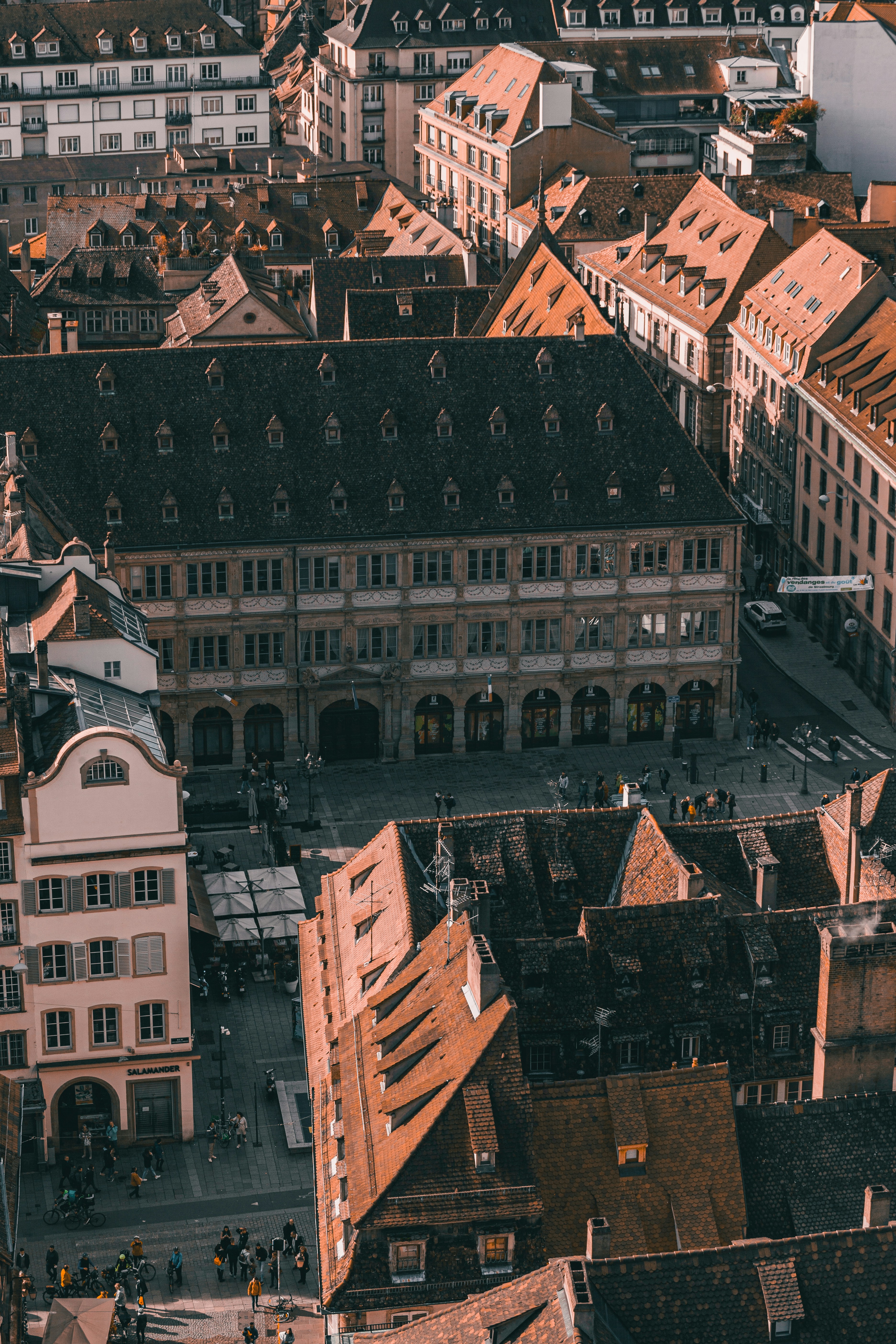 an aerial view of a city with many buildings