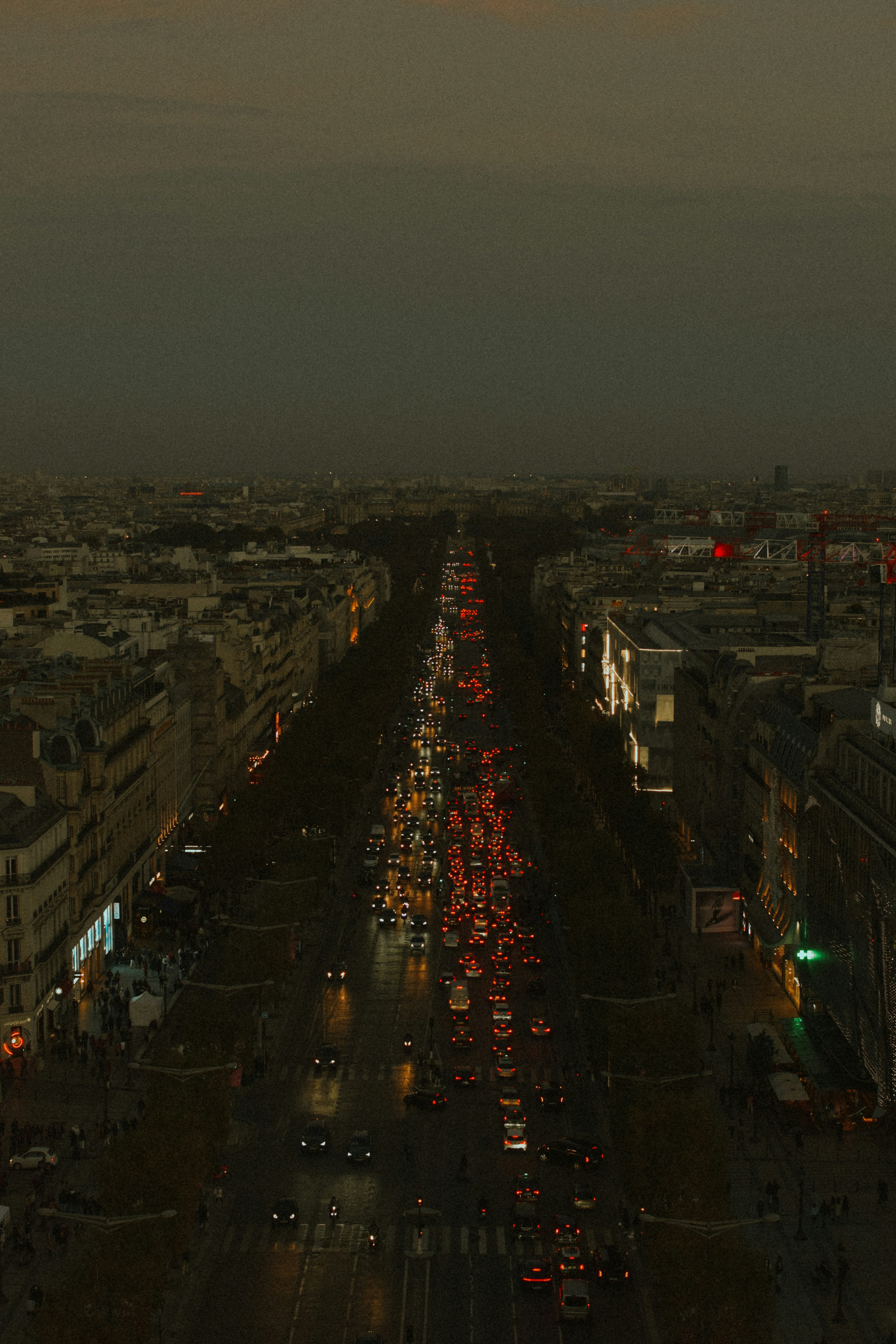 Red River of Tail Lights along a City Boulevard at Dusk
