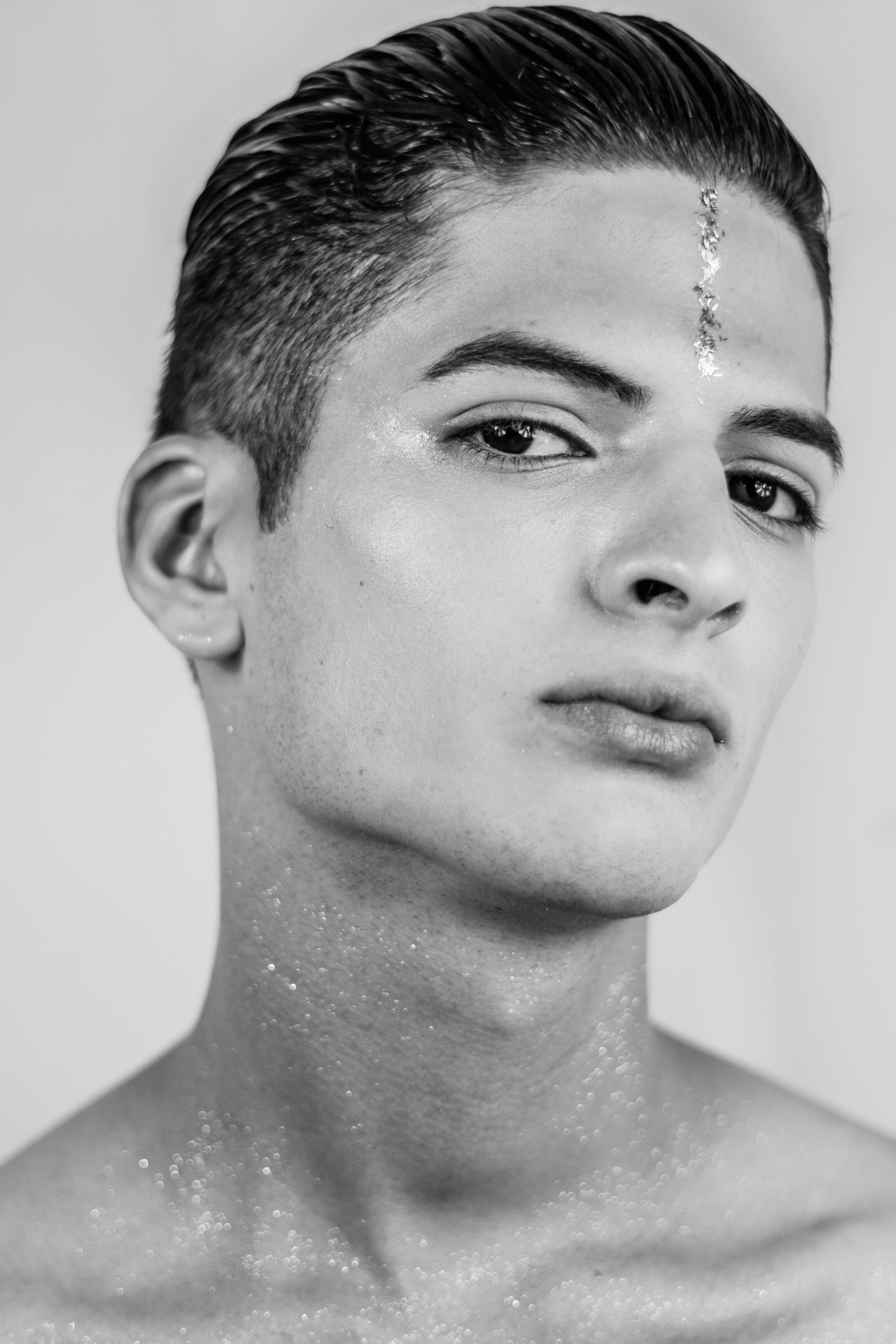 Glass-Gloss Portrait: Wet Light on a Contemplative Gaze