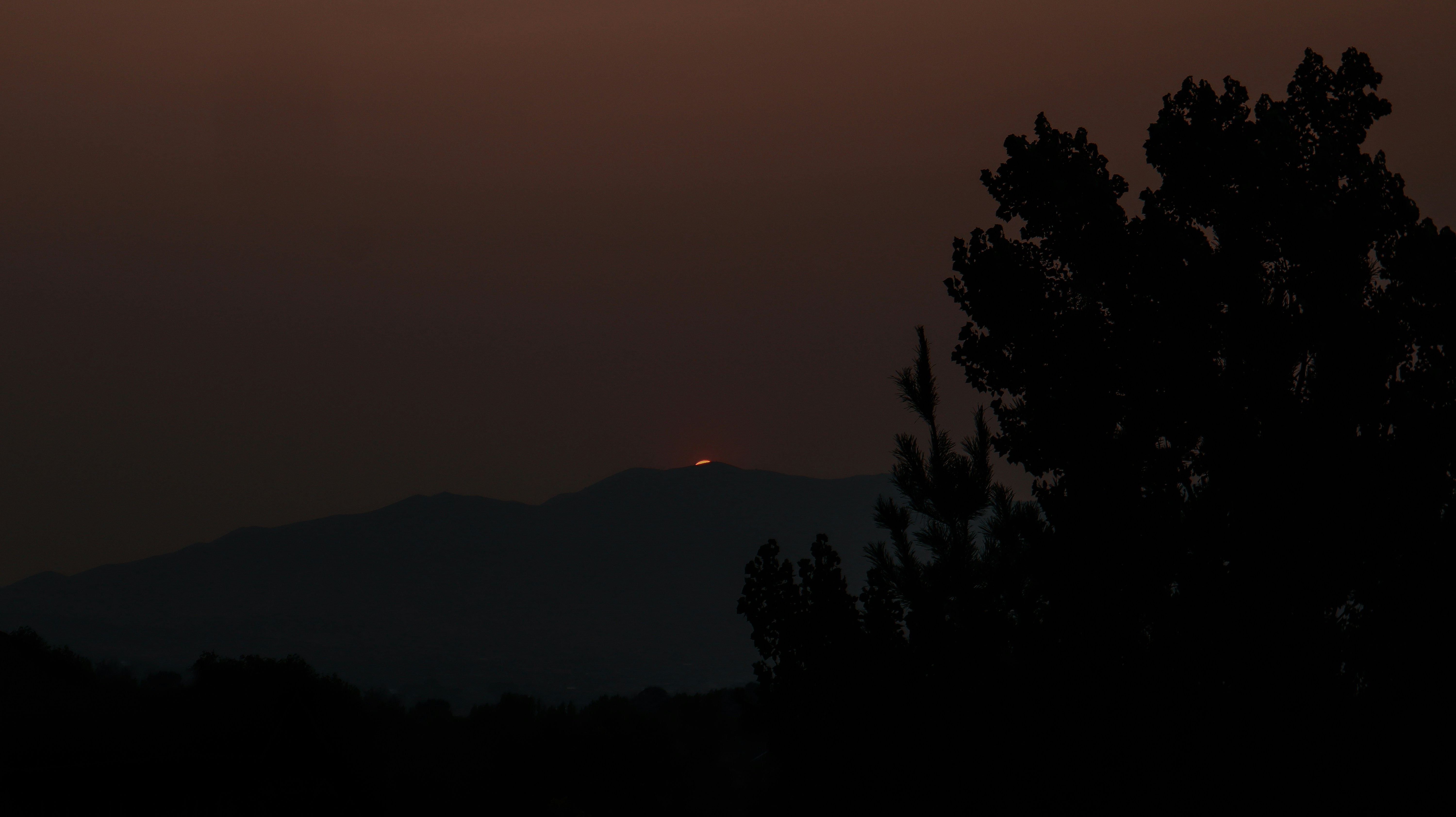 Twilight Glow Over Distant Hills