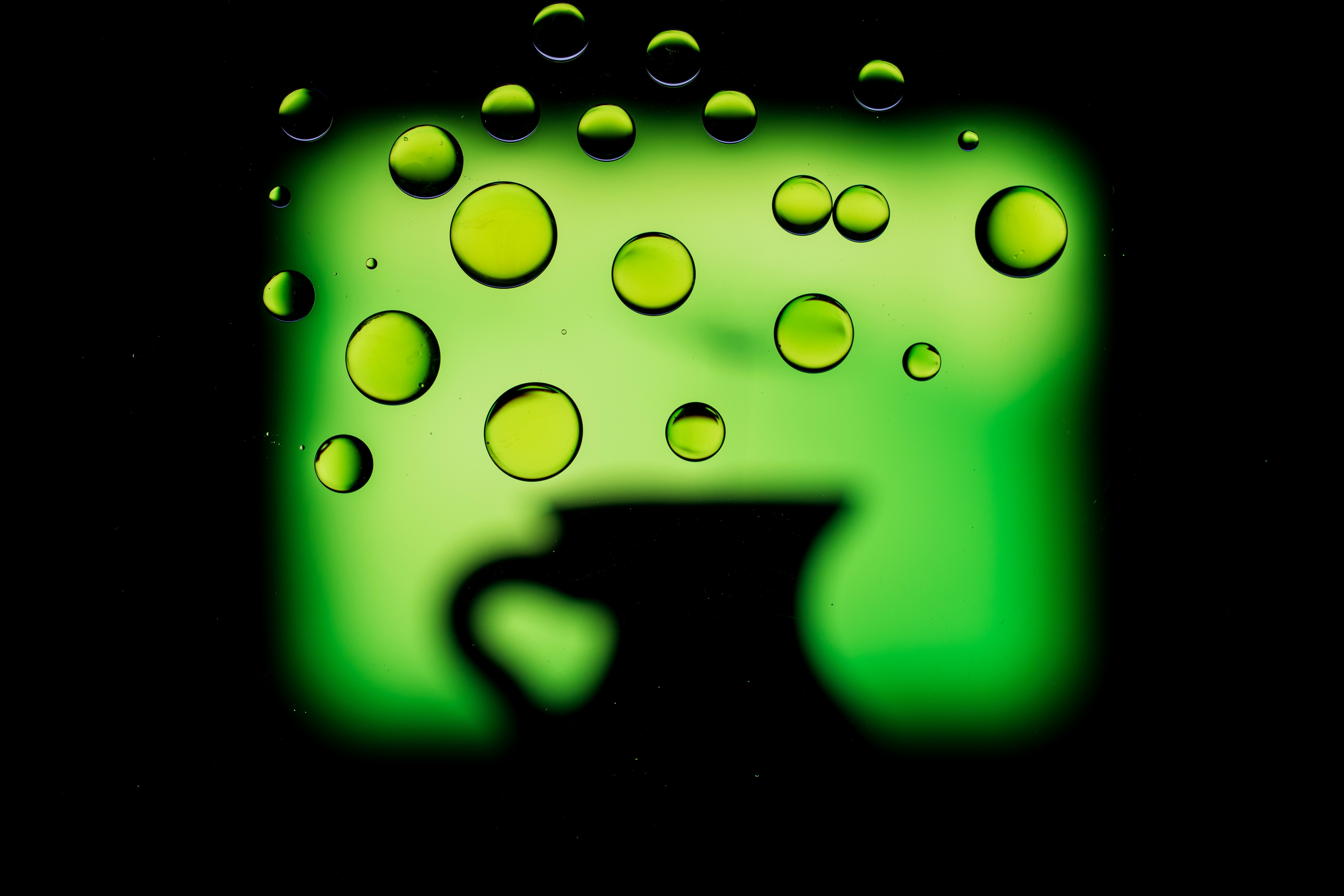 Lime-glow Window: Droplets on a Neon Pane