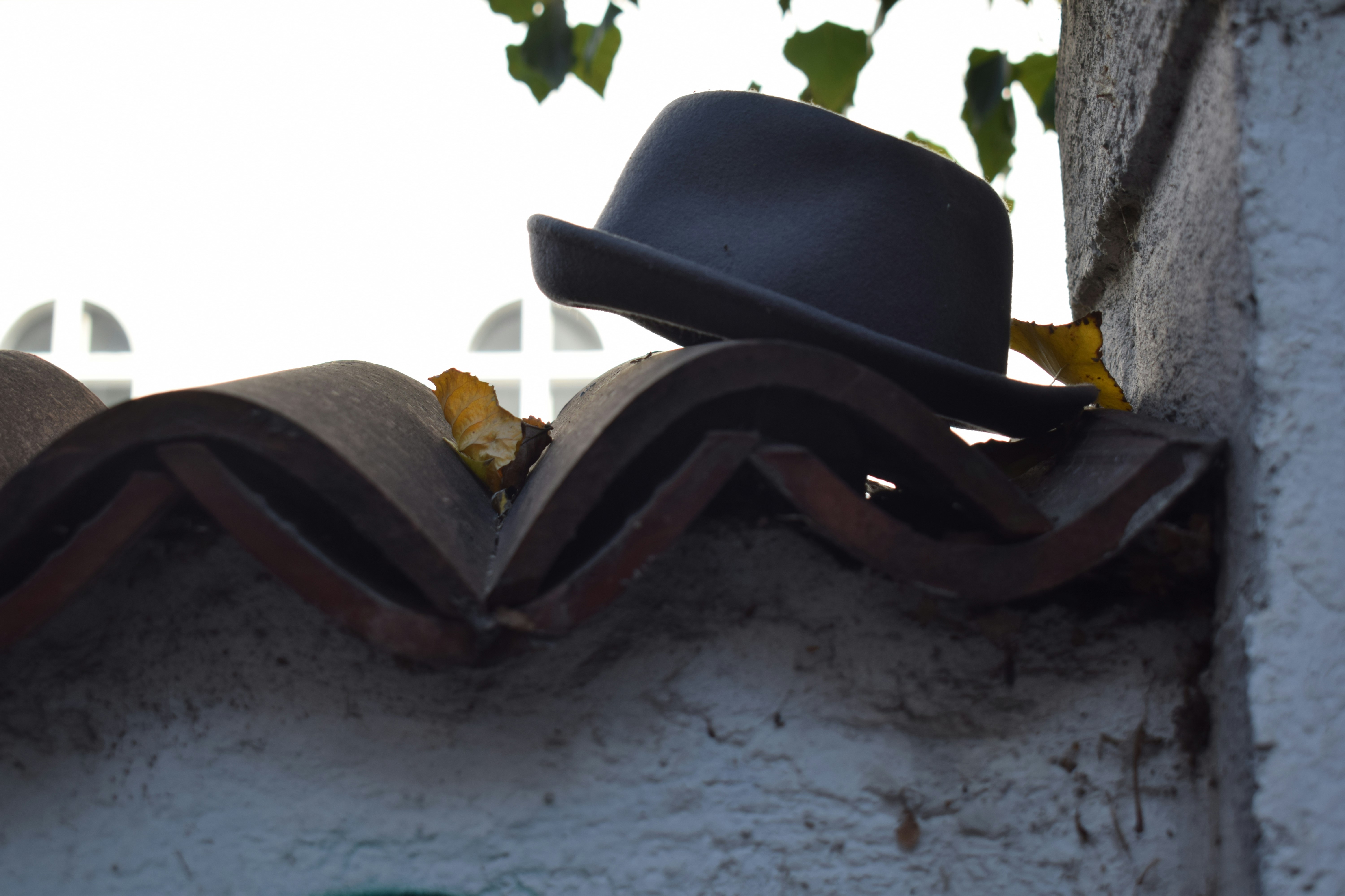 a top hat on top of a roof