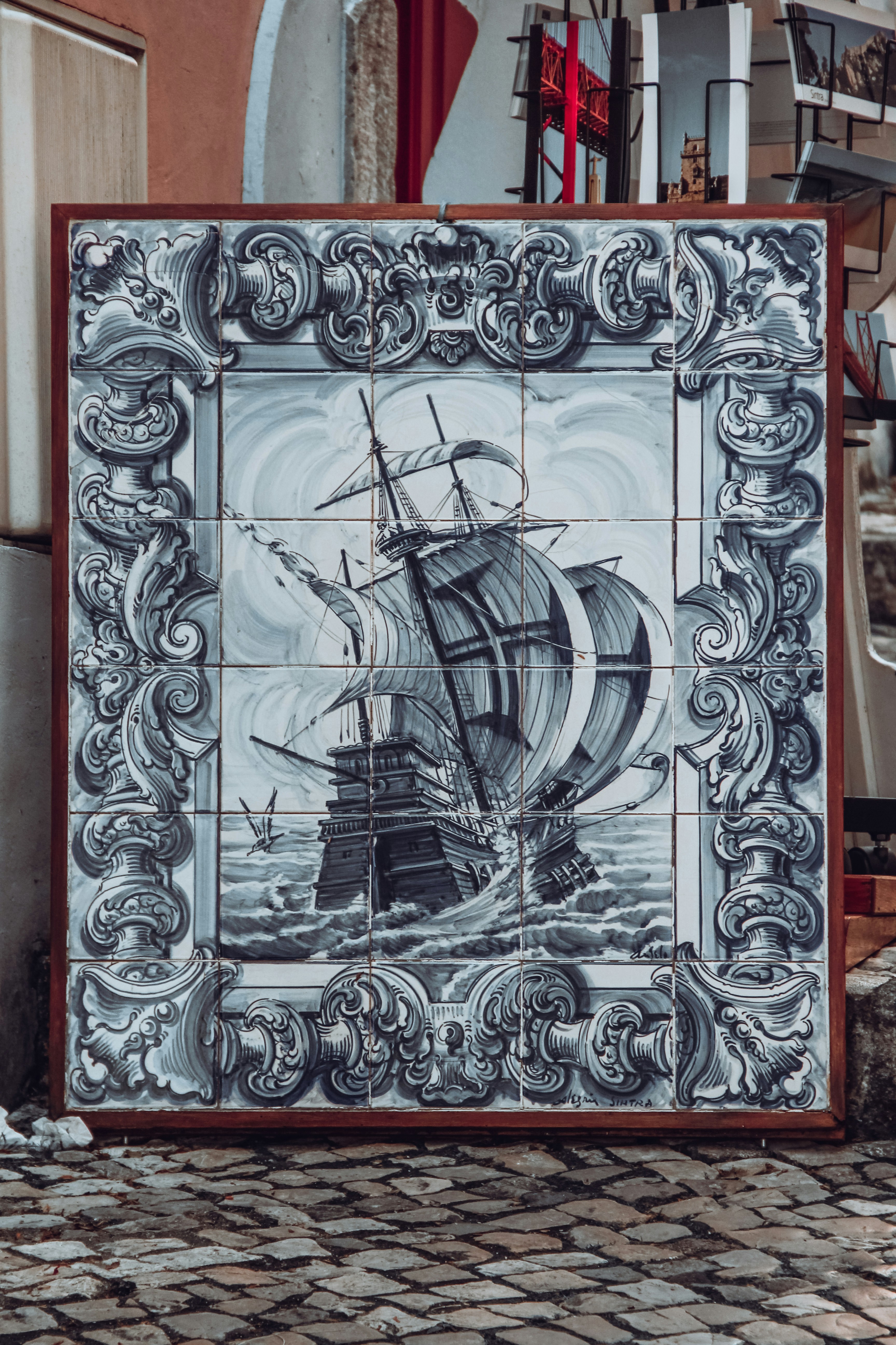 a picture of a ship on a tile