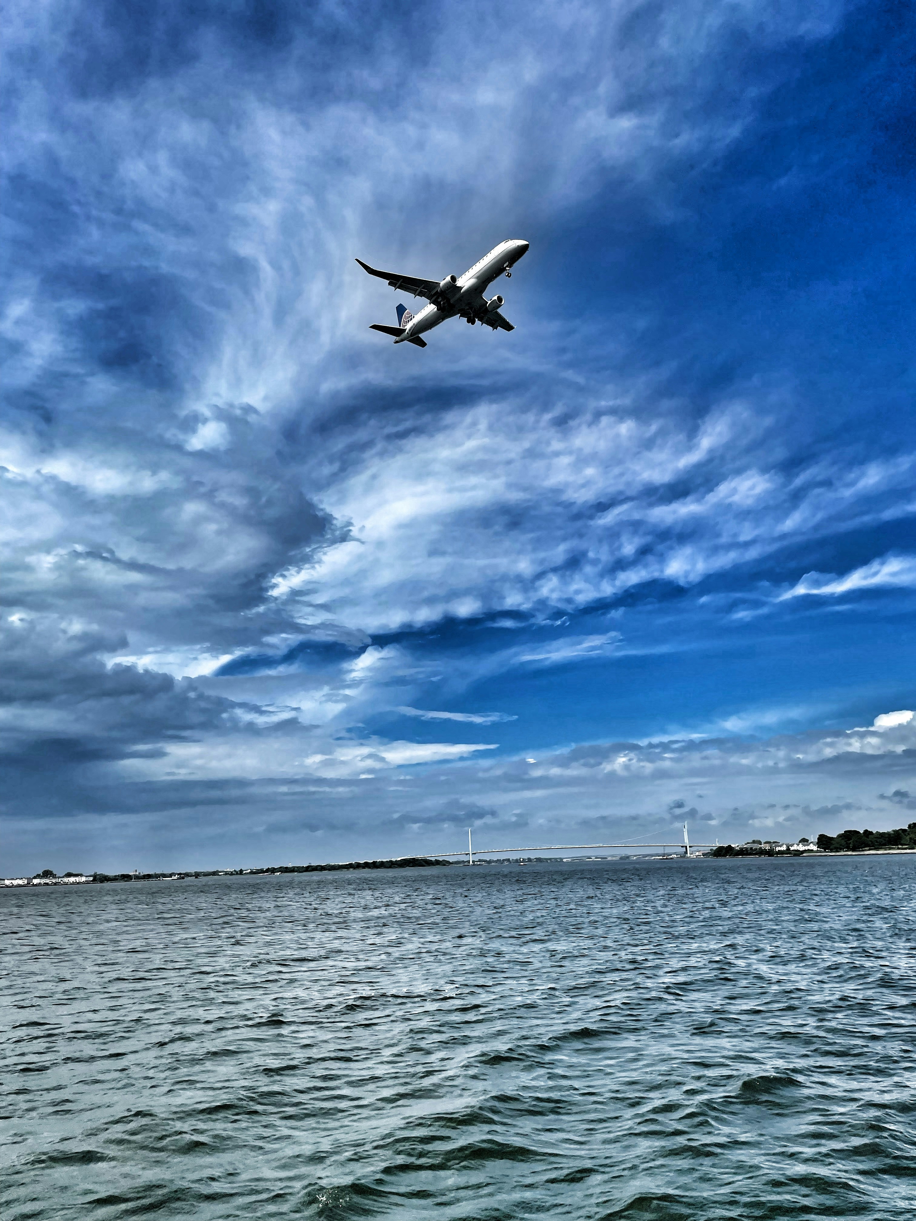 Airplane Flying Over Ocean