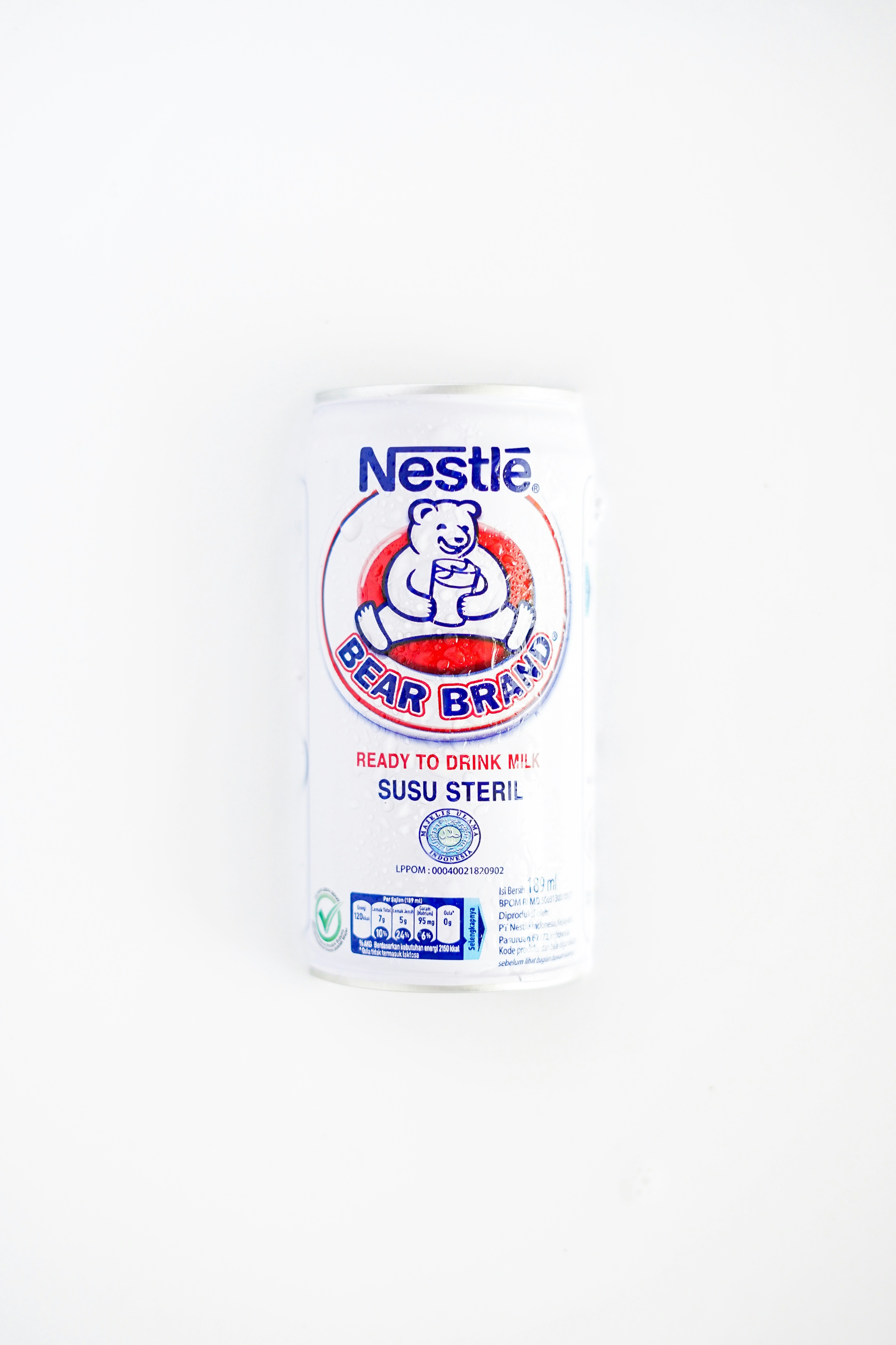 A can of nestle beer on a white background photo – Free Tin Image on ...