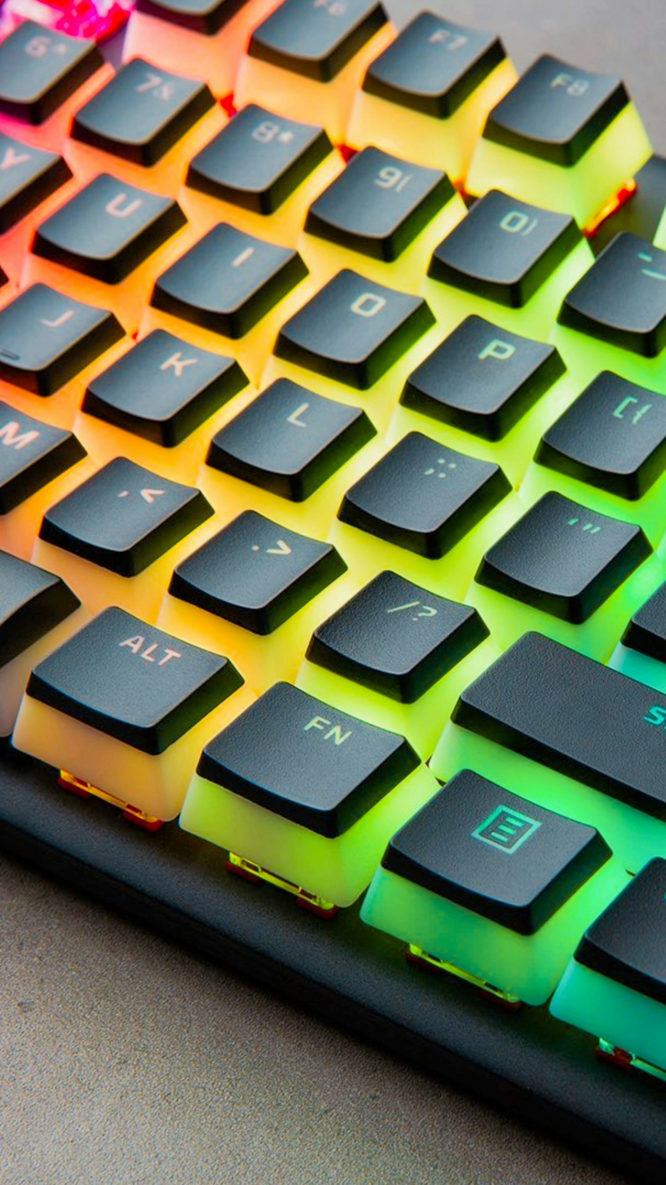 A close up of a keyboard with a multicolored key board photo – Free ...