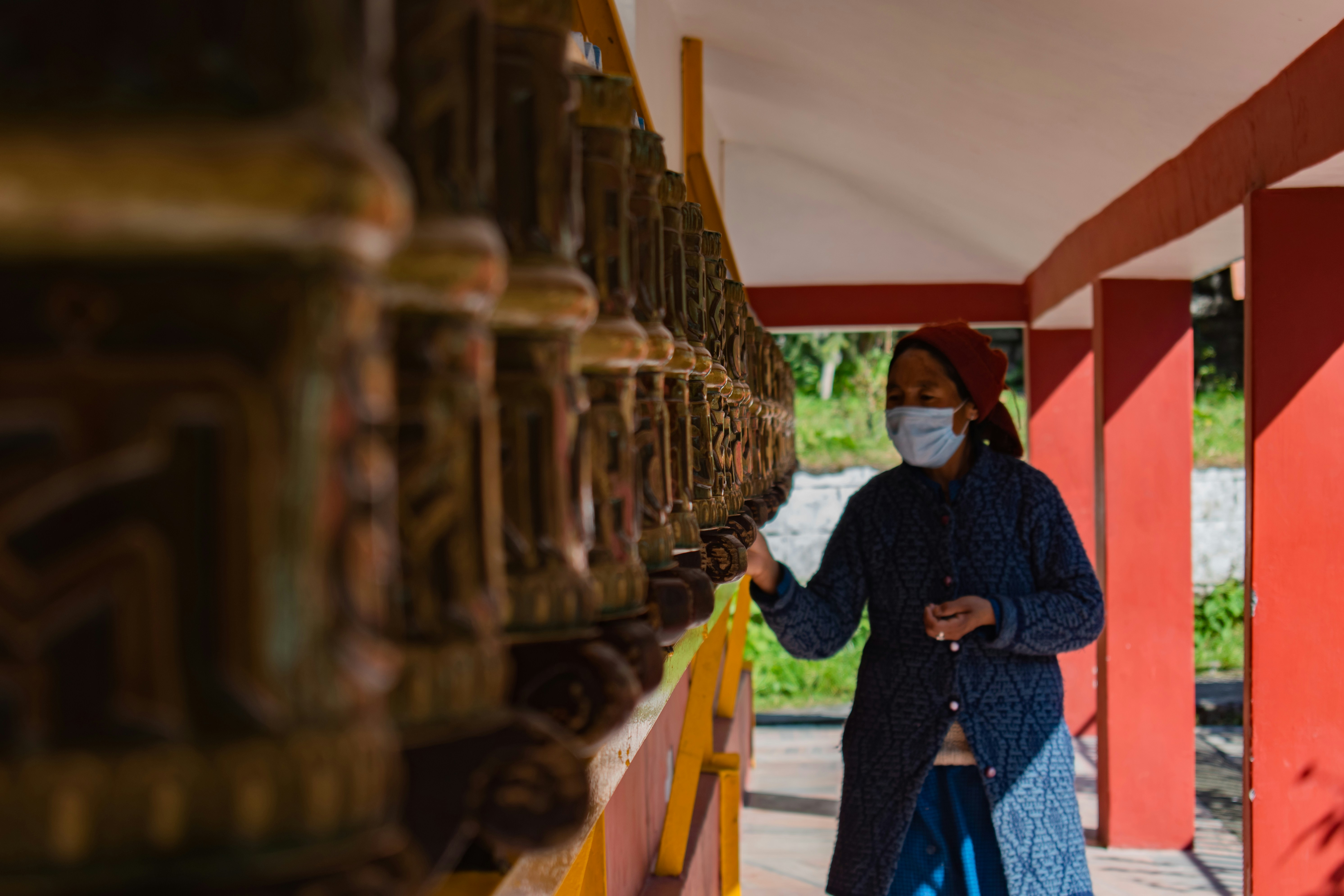 Whispers of Prayer: A Visitor in the Prayer Wheel Corridor