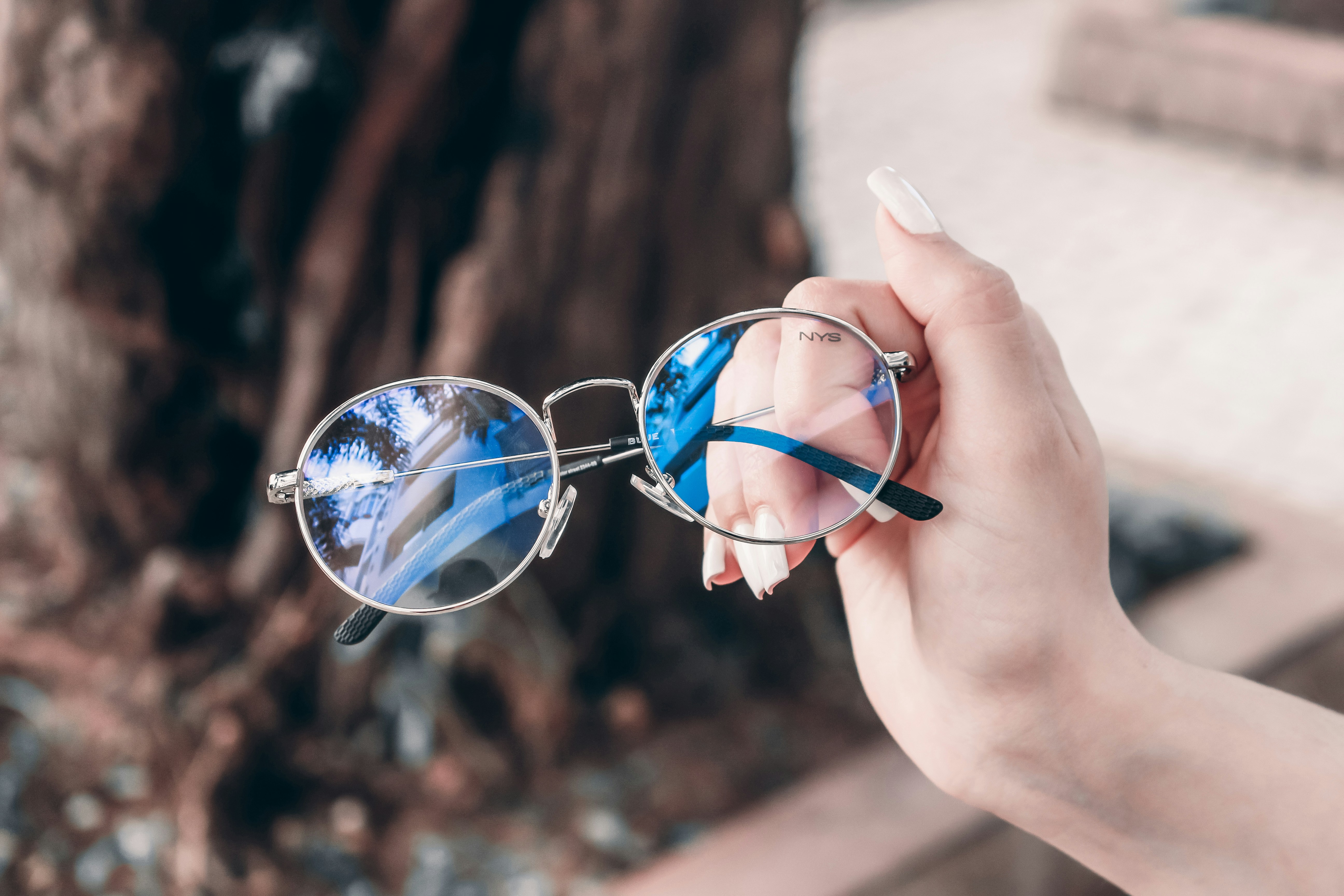 Blue Reflections in a Handheld Glass Frame