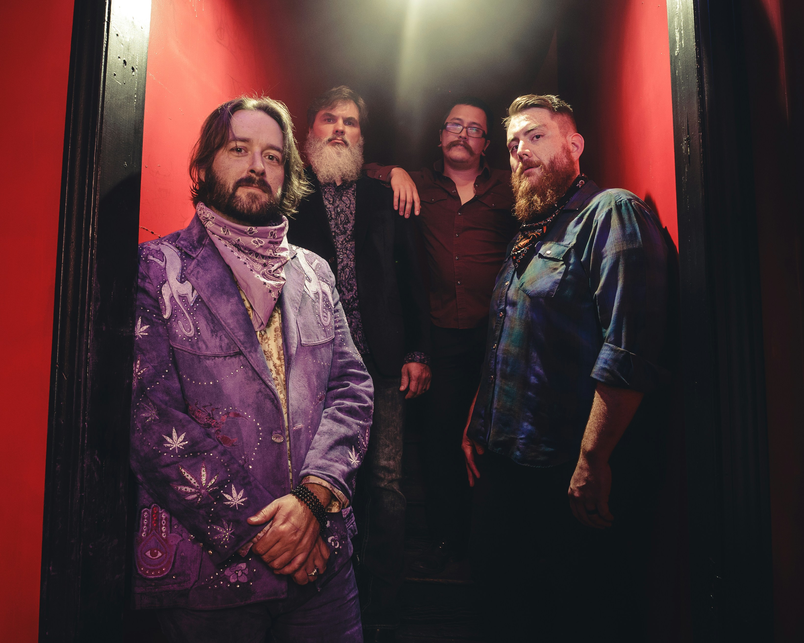 A group of men standing next to each other photo – Free Lighting Image ...