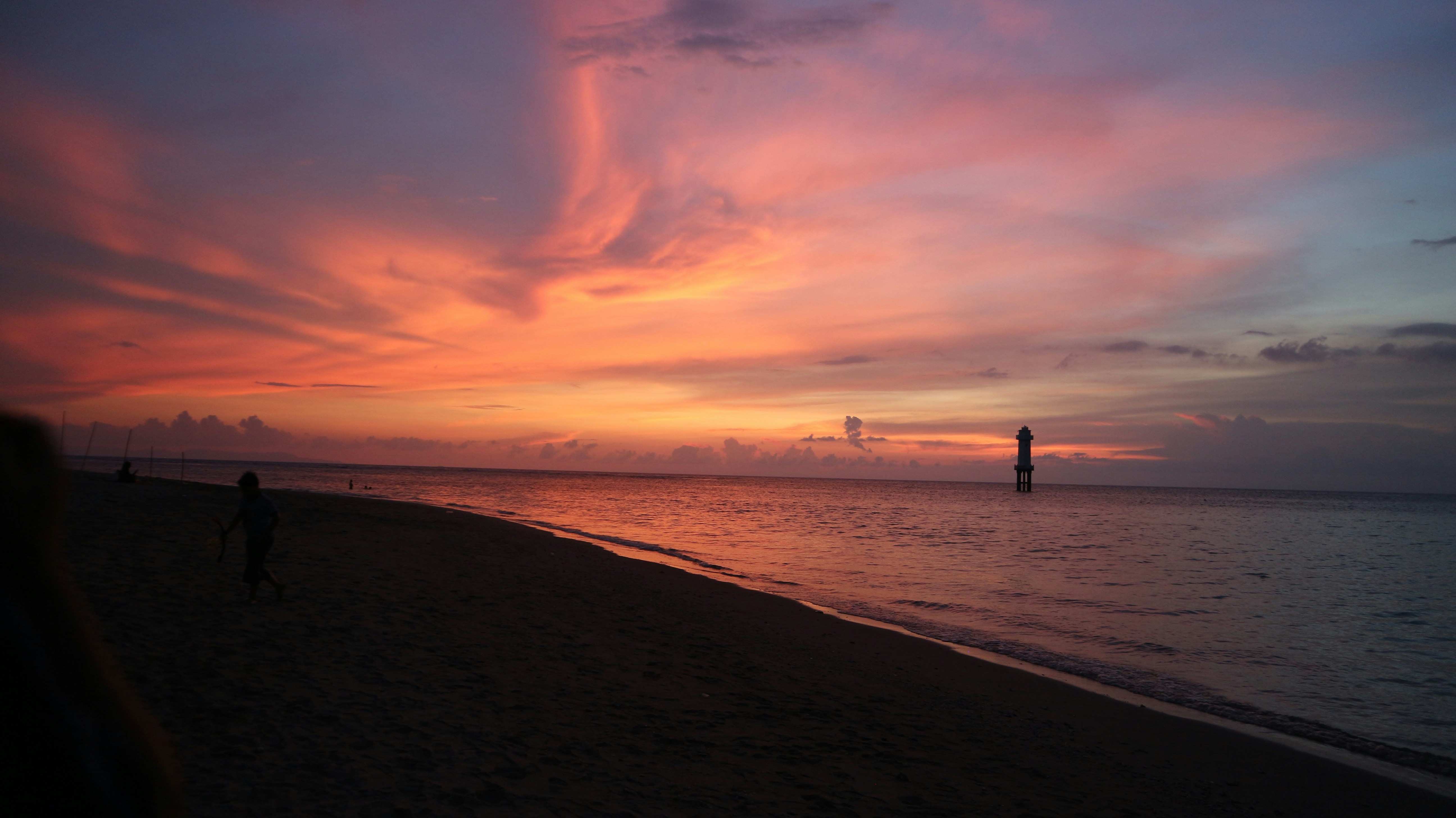 Dusk Beacon Over Quiet Tides
