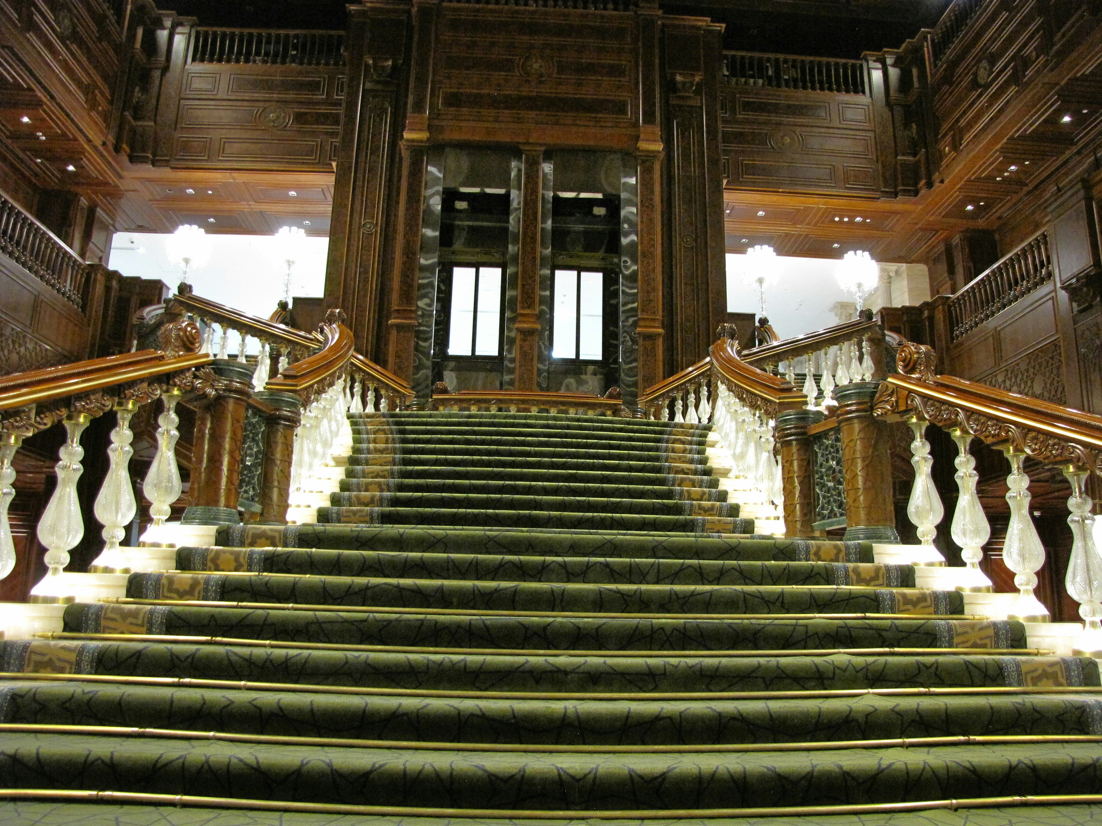 A set of stairs leading up to a large wooden building photo – Free Iran ...