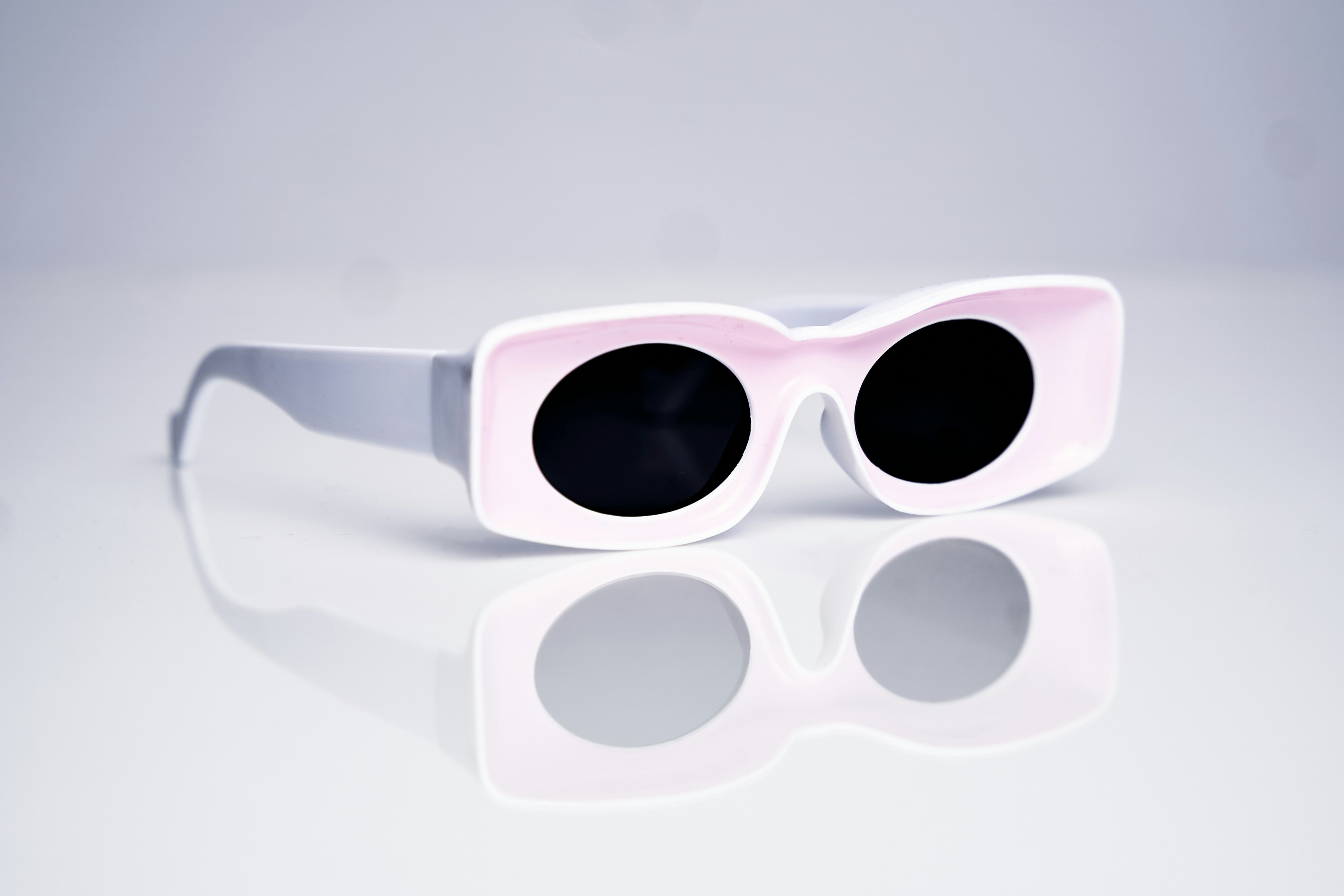 Echoes of Pink on a Glassy Stage