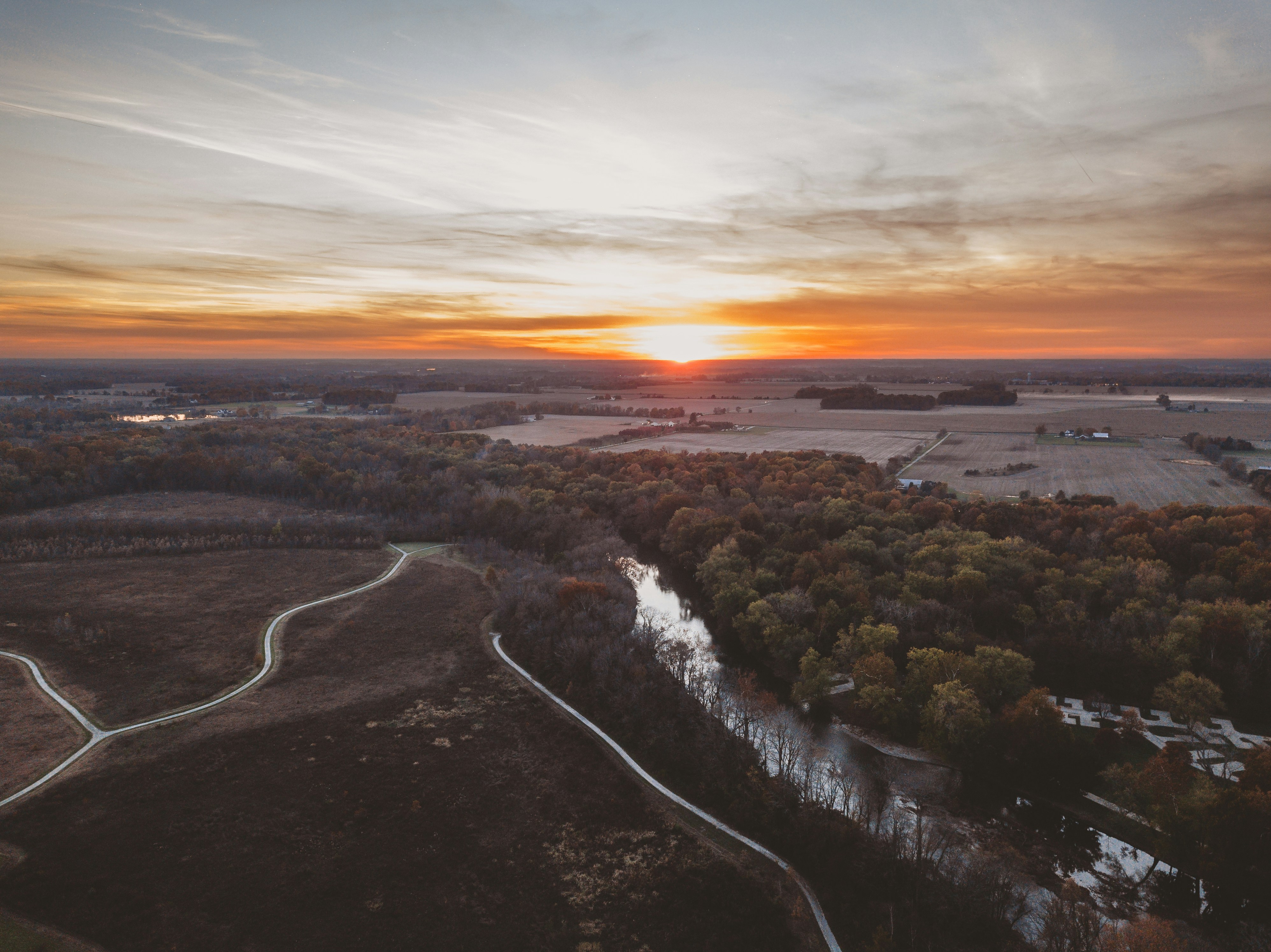 An aerial view of a sunset over a rural area photo – Free Strawtown ...